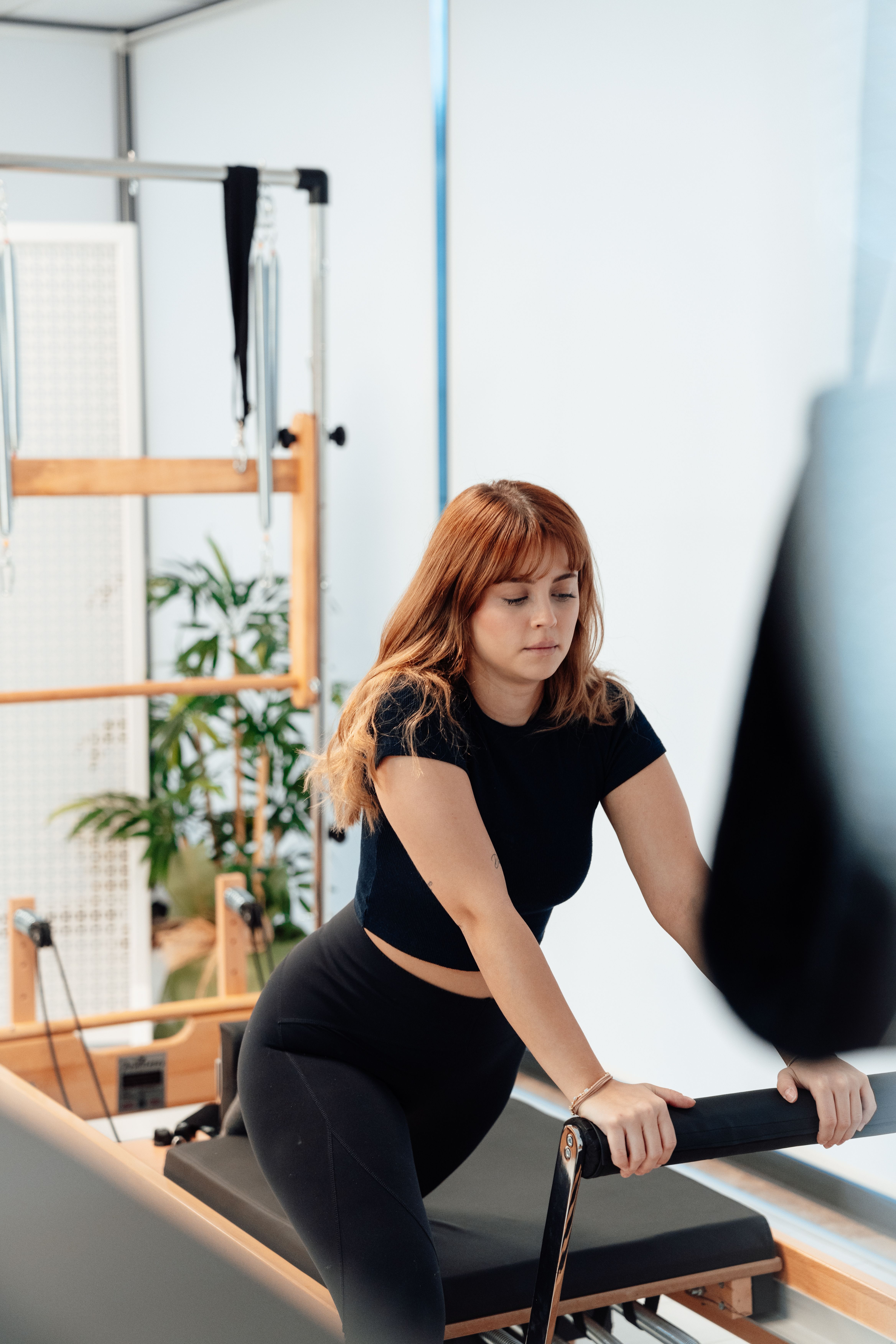 Red Haired Woman Doing Pilates Workout · Free Stock Photo