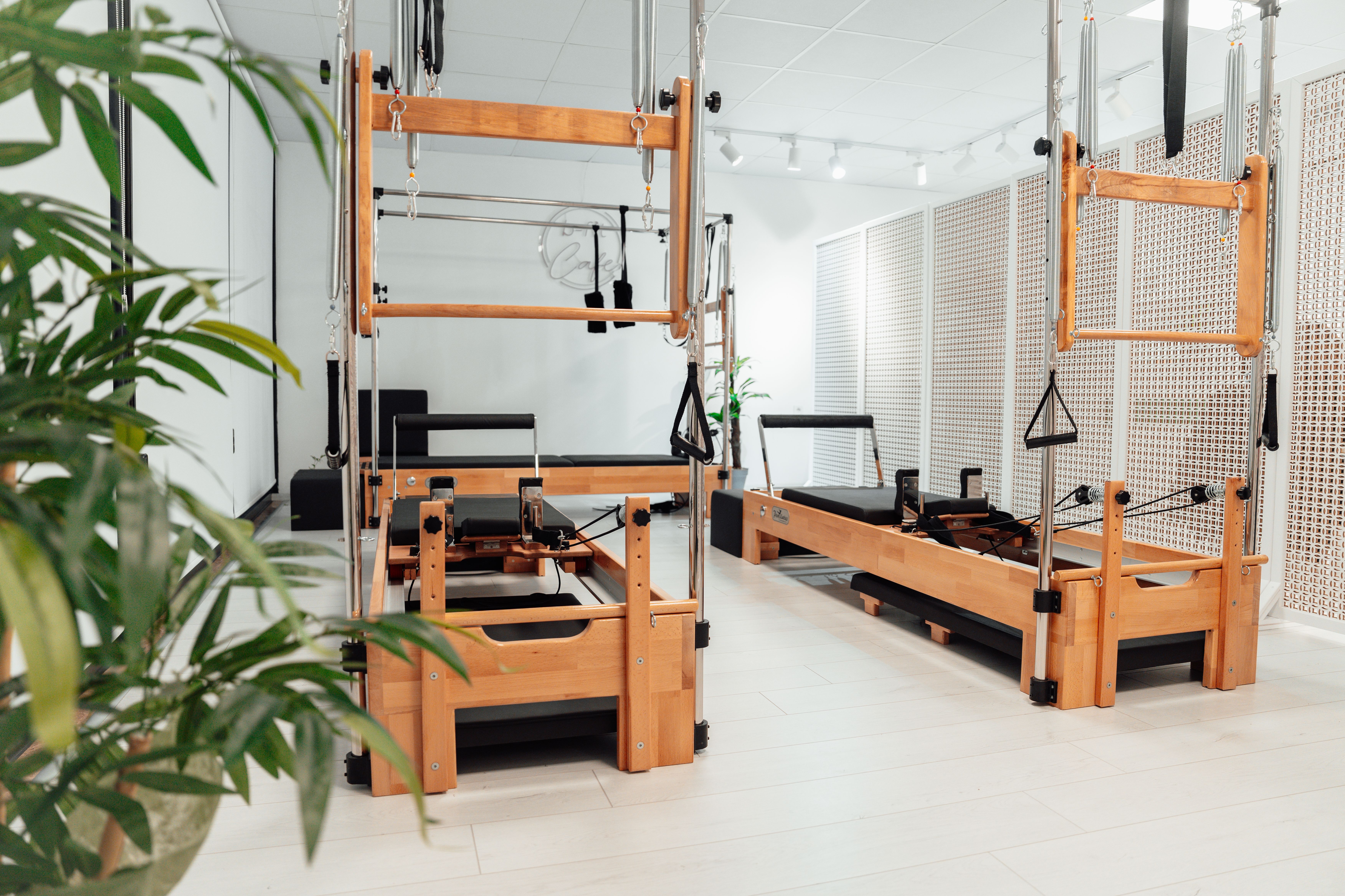 Pilates Towers in a White Room · Free Stock Photo