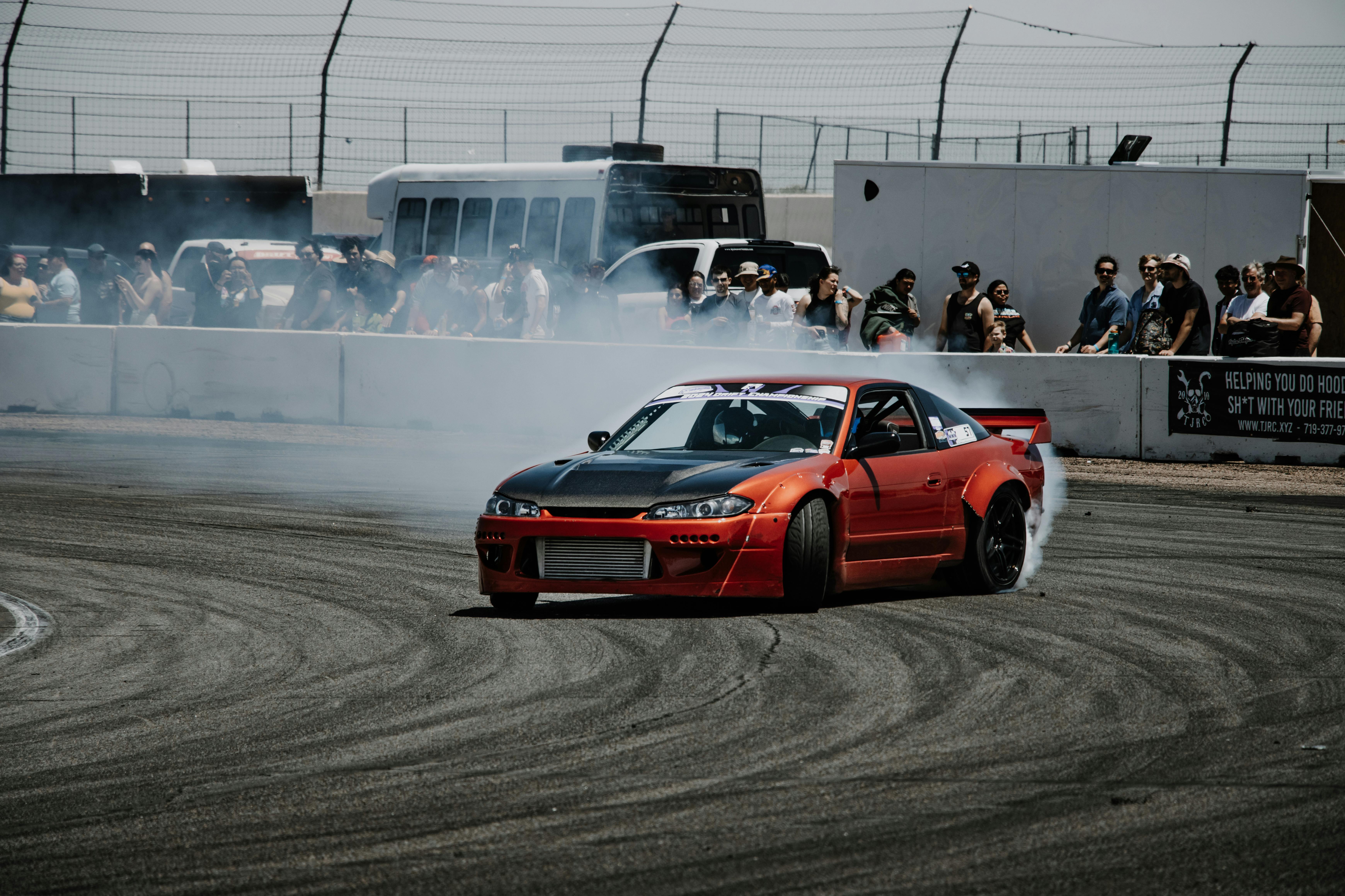 Exciting Car Drifting Action at Motorsport Event · Free Stock Photo