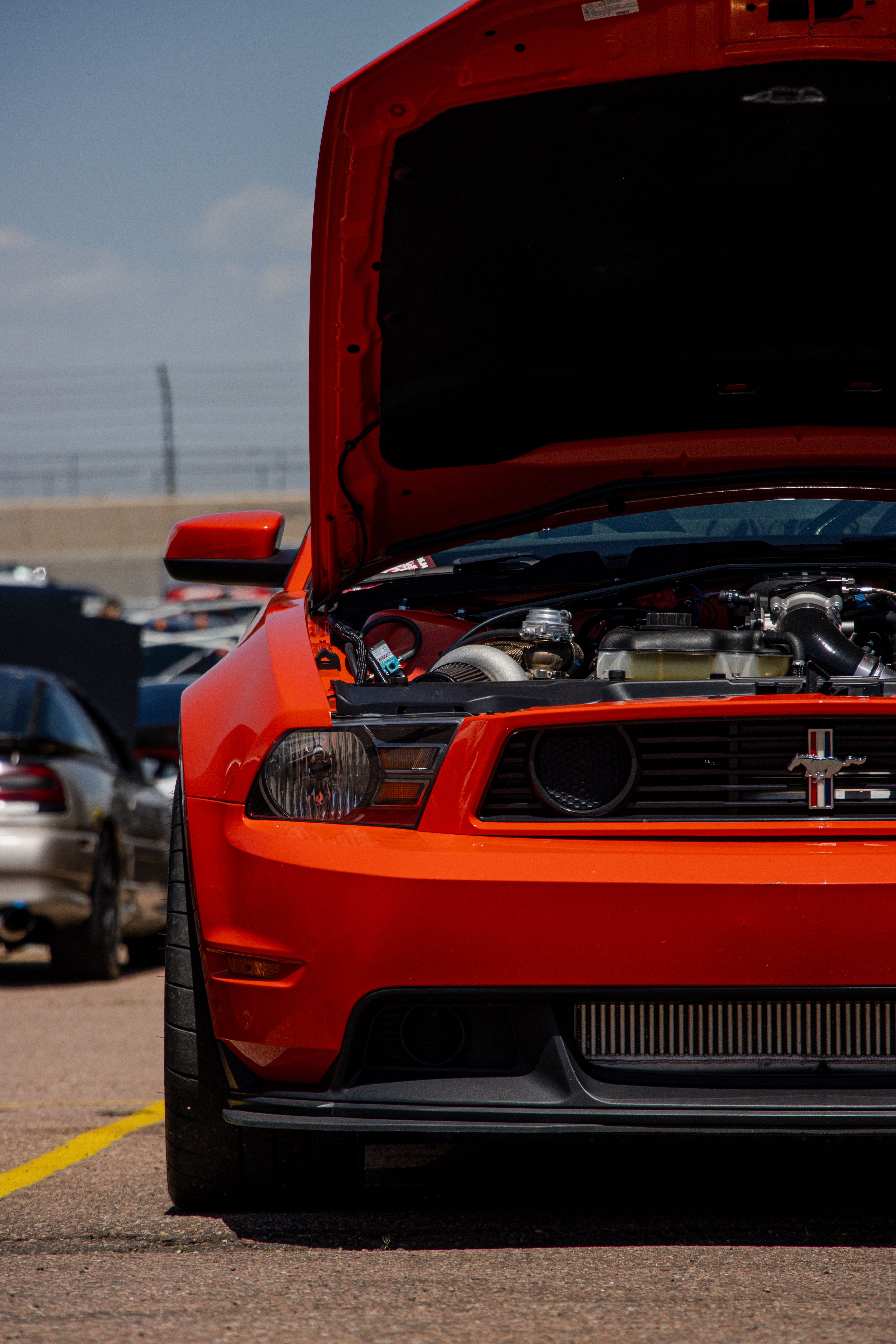 A Parked Dodge Challenger with an Open Hood · Free Stock Photo