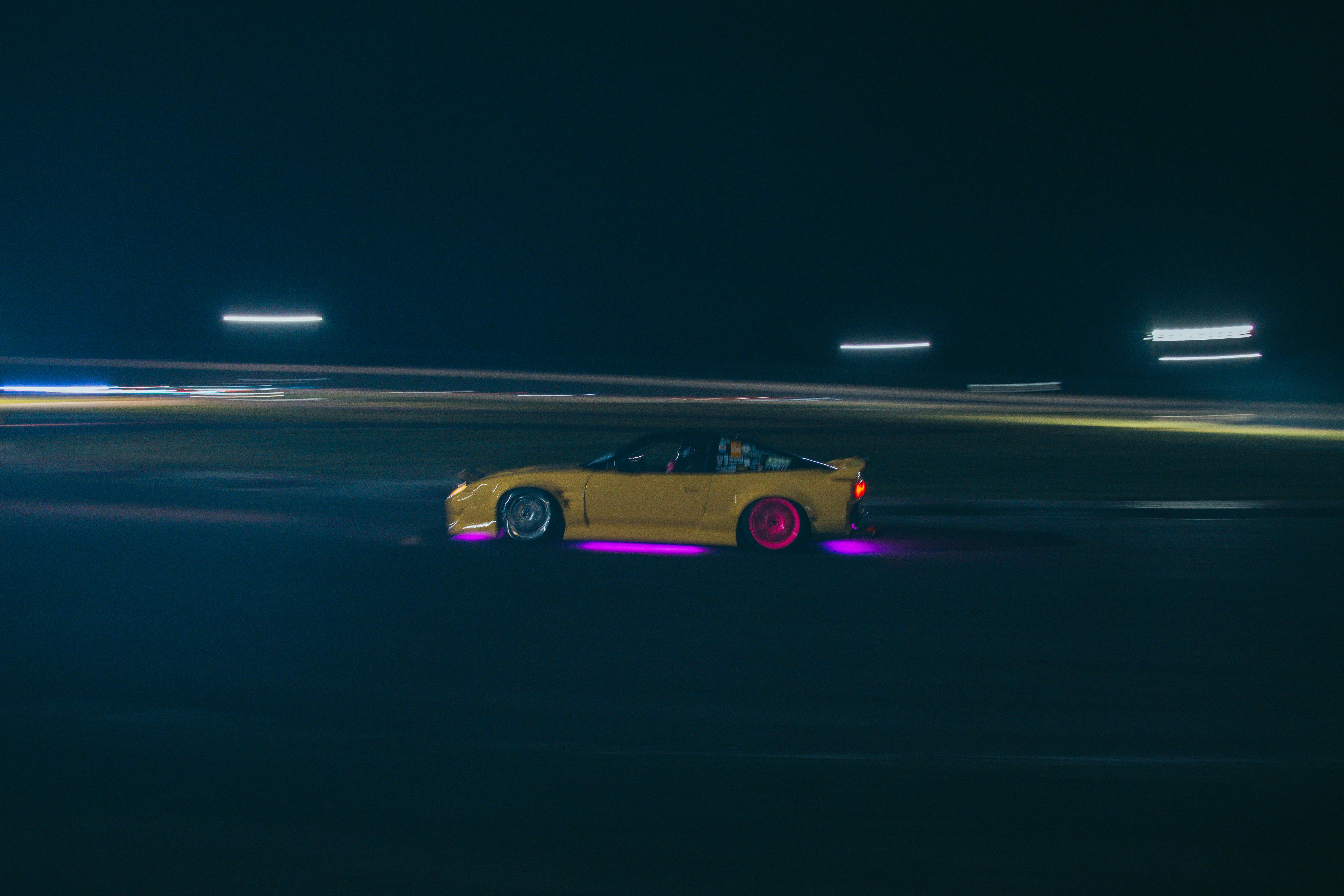 Blue Nissan Skyline R34 GTR at Night · Free Stock Photo
