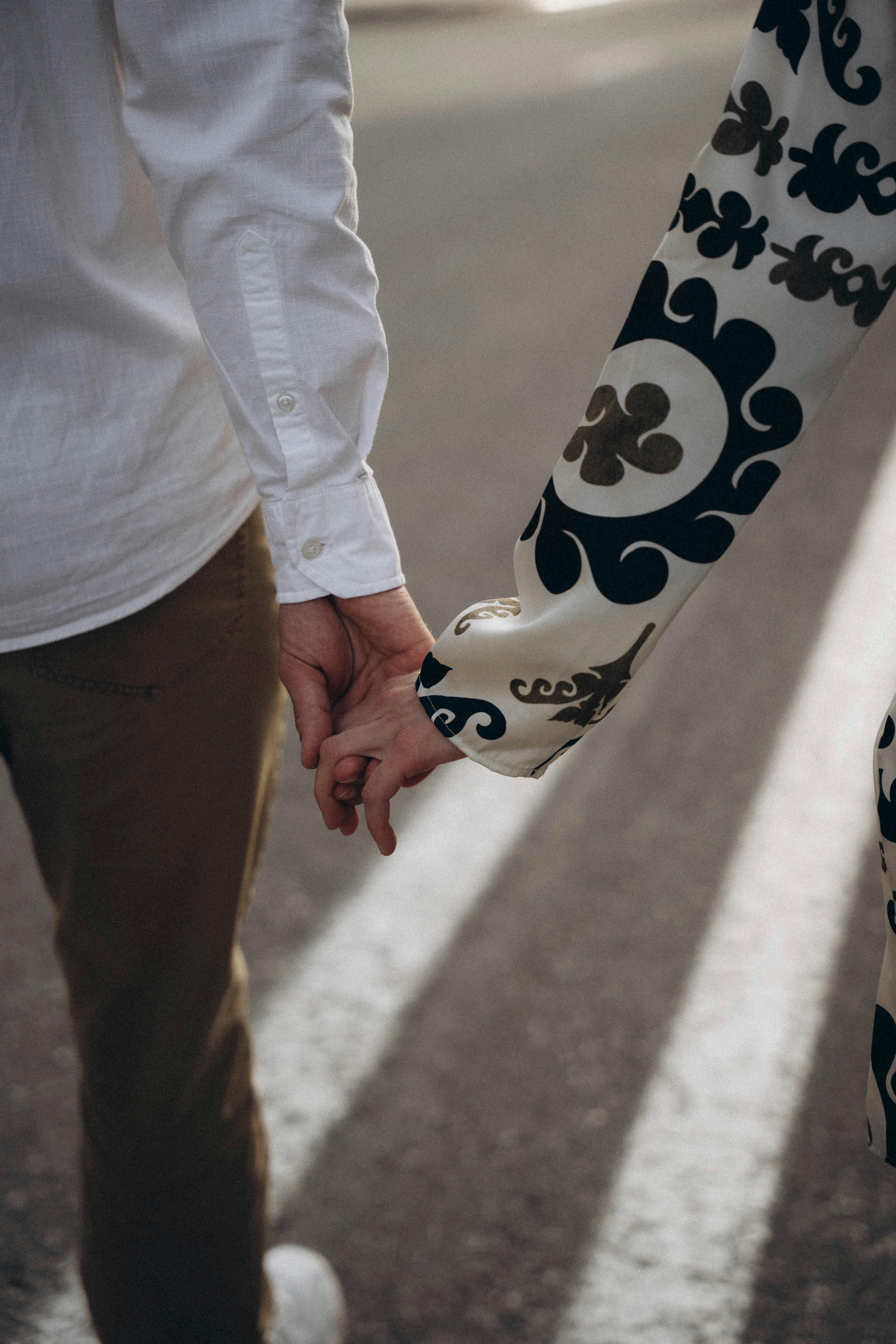 Couple Wearing Torn Clothes Walking Holding Hands Going Forward Shadows ...