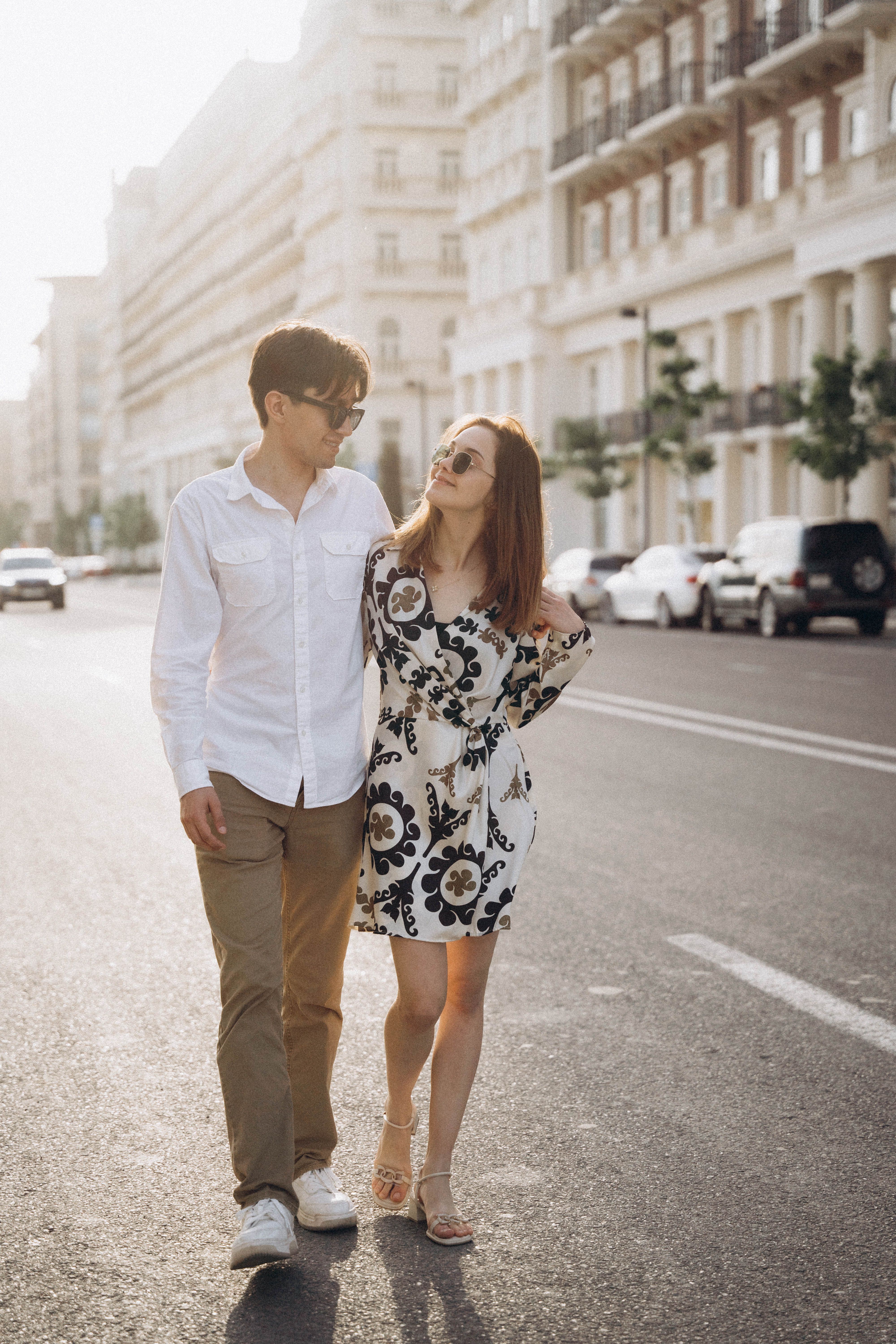 Man in Shirt and Woman in Sundress on Street · Free Stock Photo