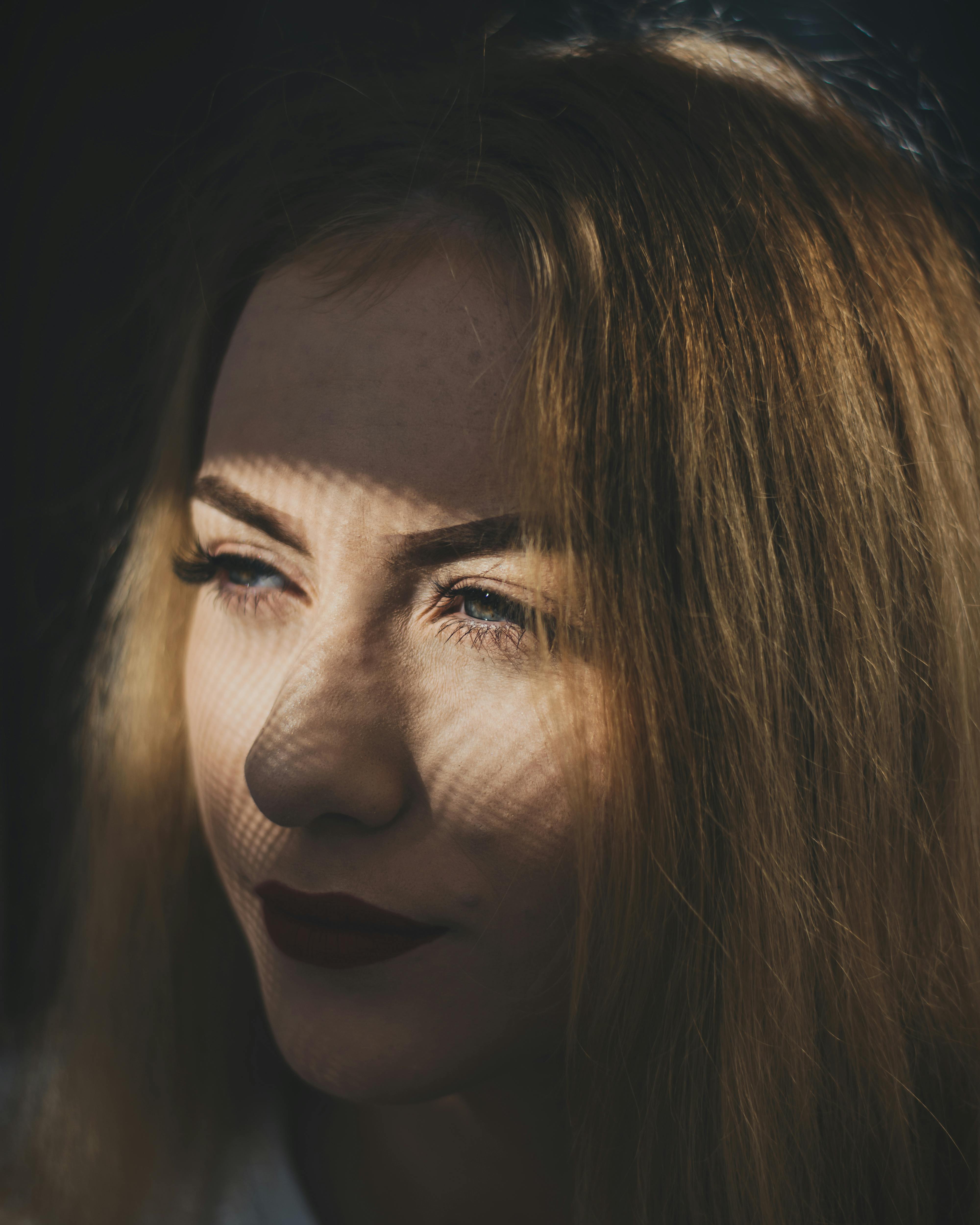Close-up Photo of Woman Holding Her Chin · Free Stock Photo