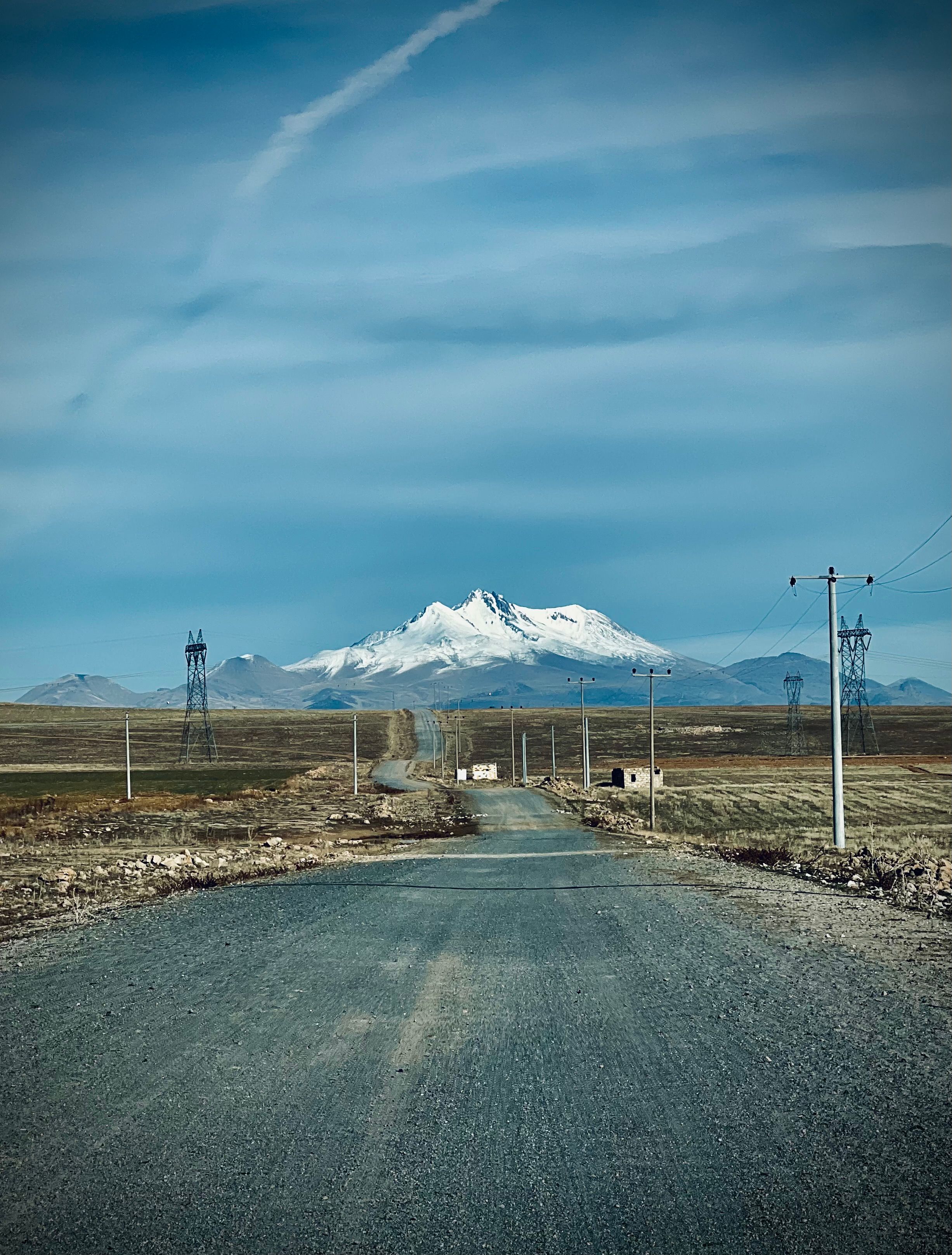 Remote Road with Mountains in the Background · Free Stock Photo