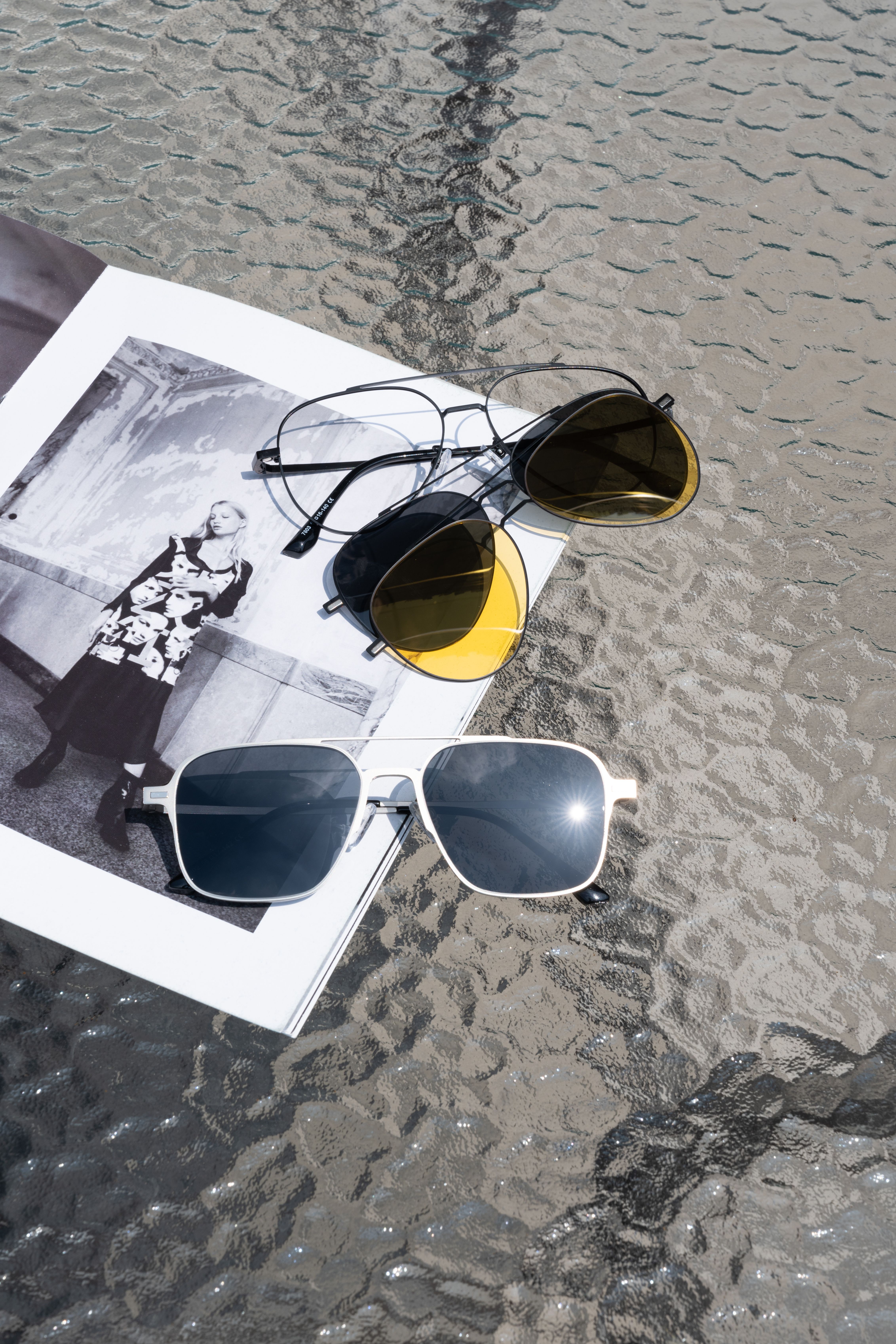 Stylish Shades: A Modern Display of Sunglasses on Fashion Magazine ...