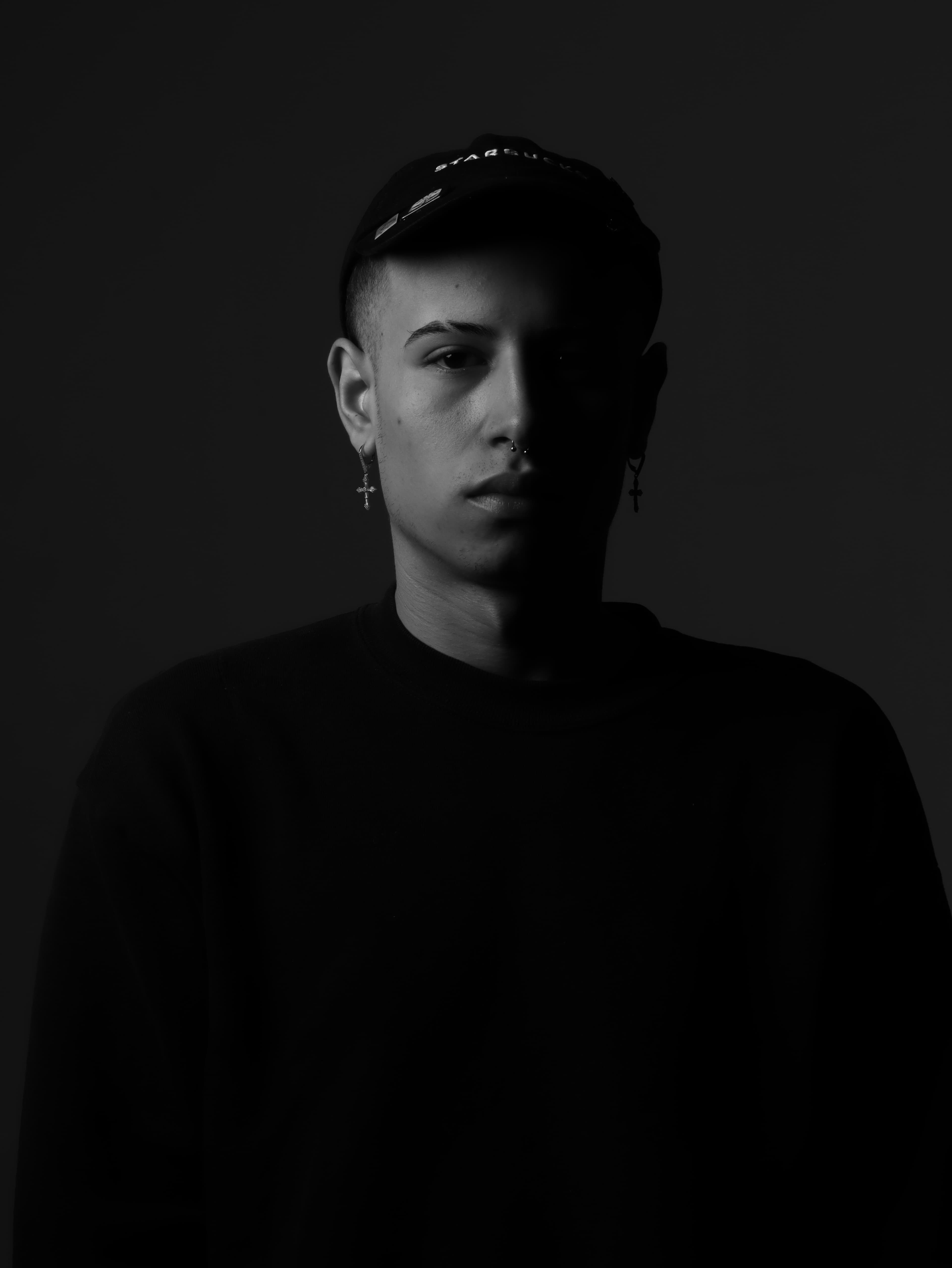 Fashion Model Posing On a Black Background · Free Stock Photo