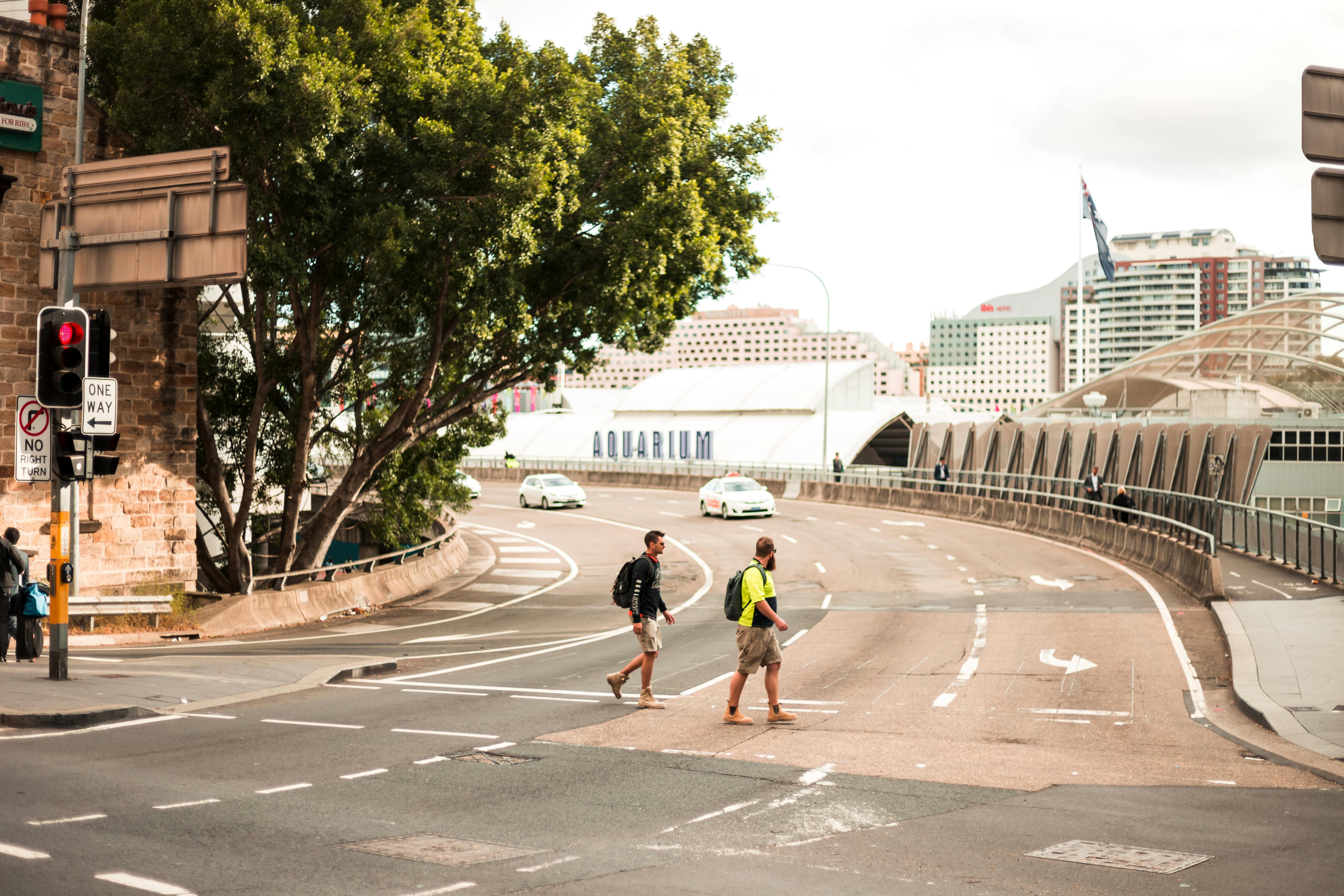 Two People Crossing The Street · Free Stock Photo