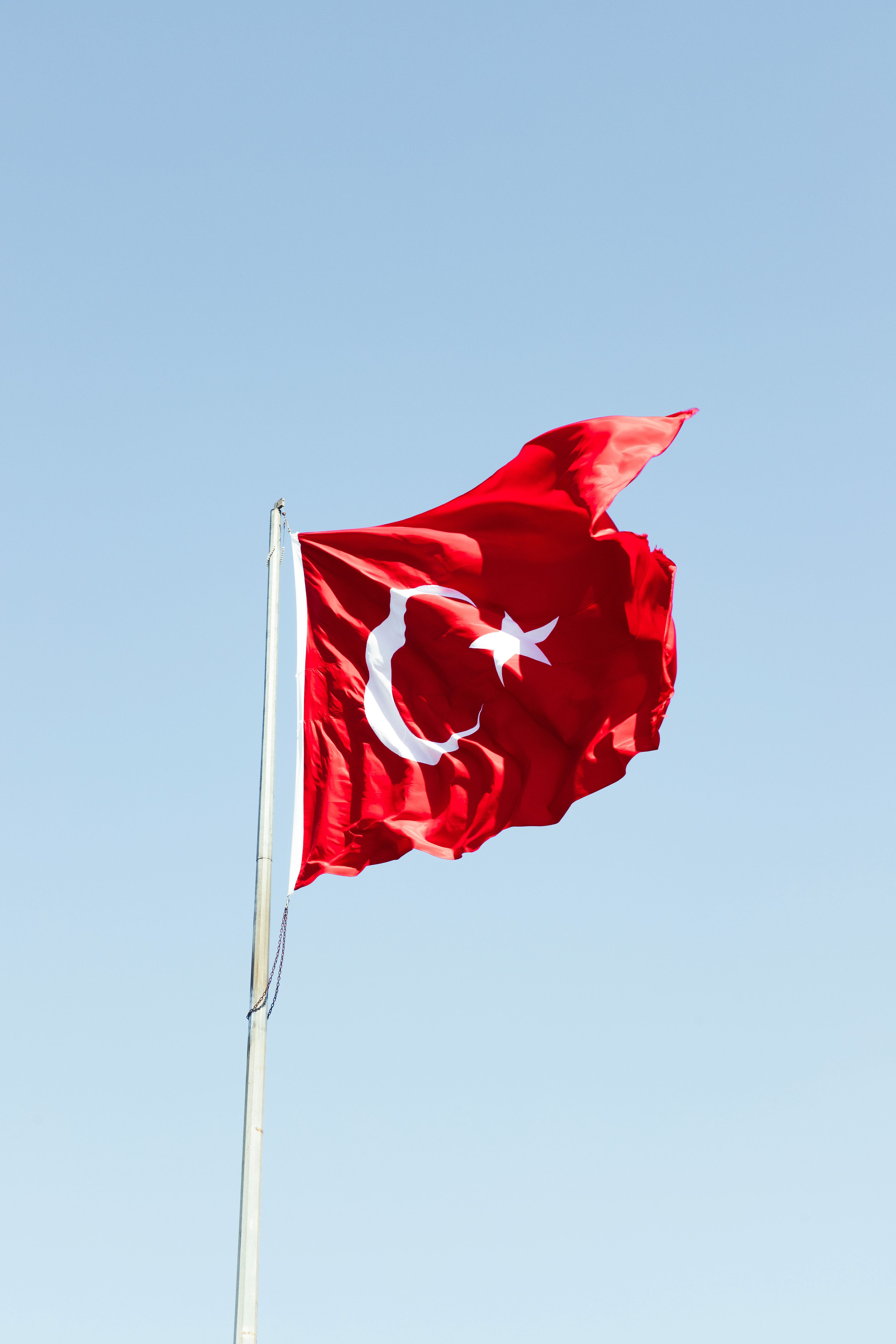 Turkey's flag is flying high in the sky · Free Stock Photo