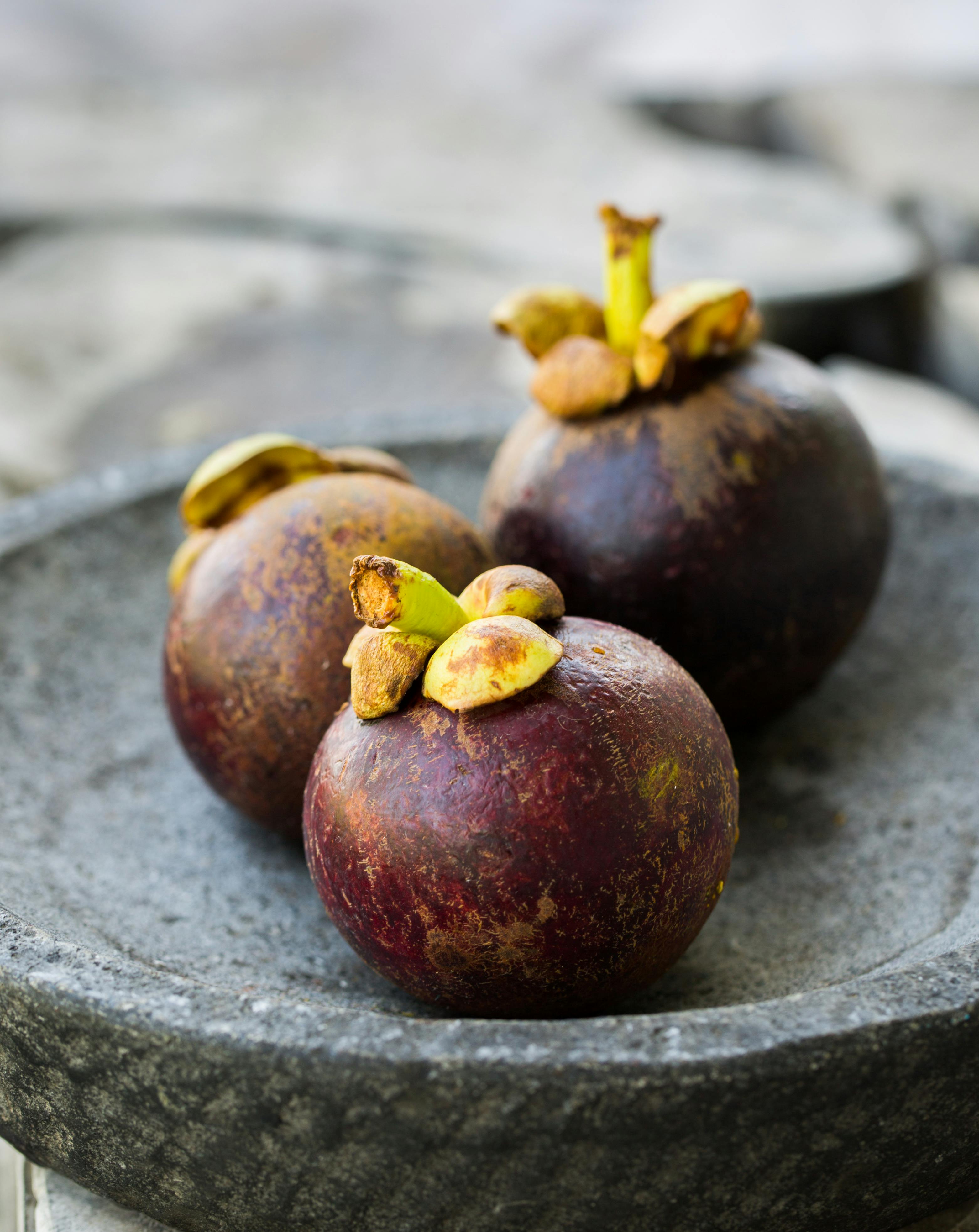 Close-Up Photo of Mangosteens · Free Stock Photo