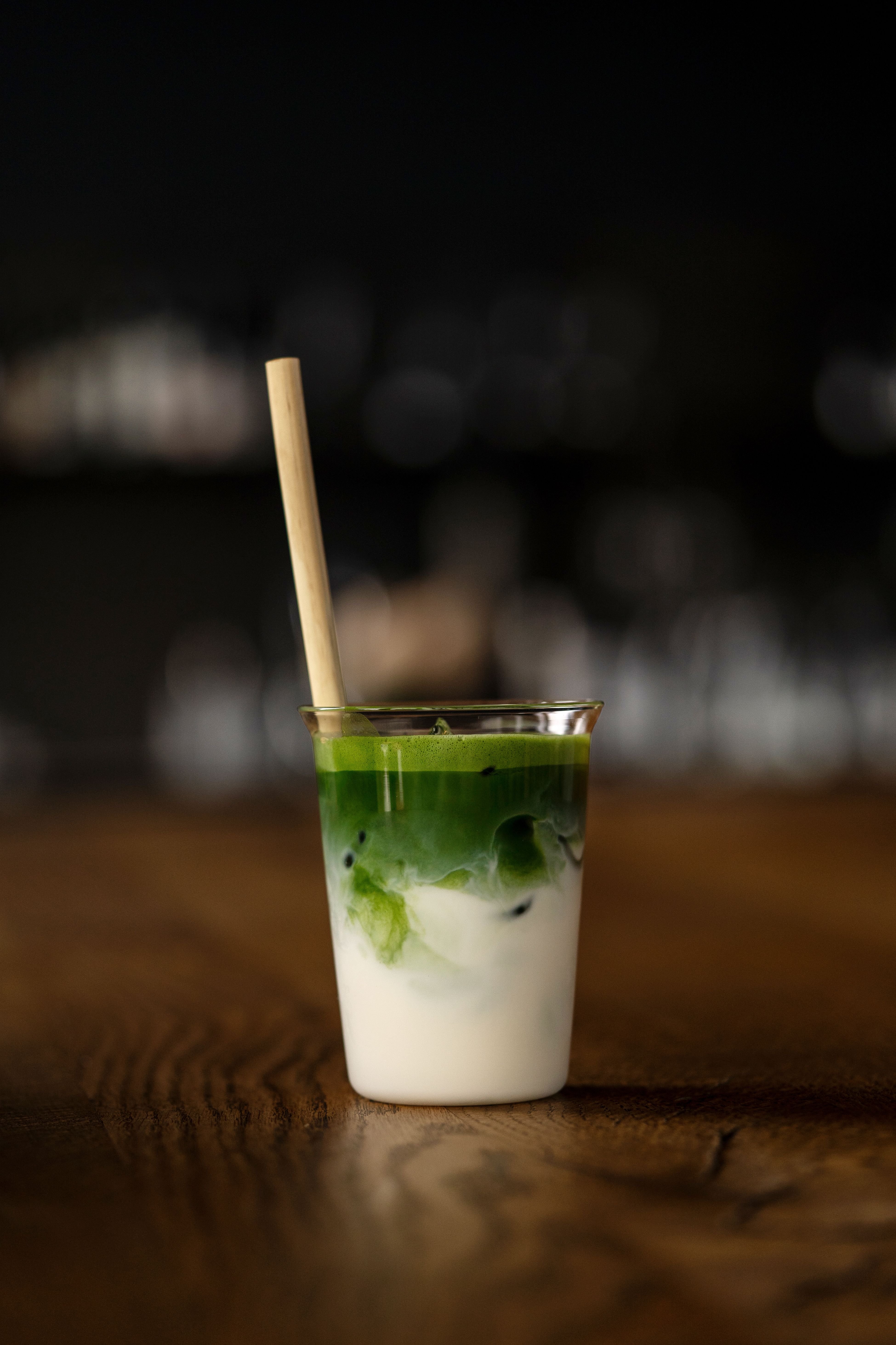 Hand Holding Straw in Cocktail Glass · Free Stock Photo