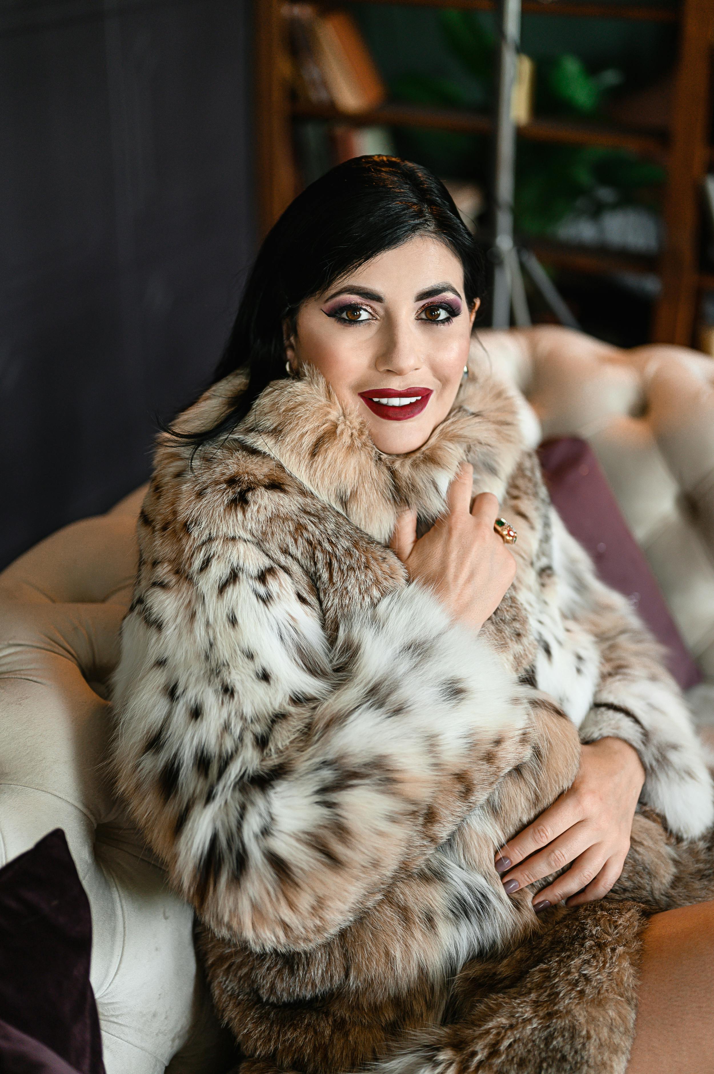 Sitting Woman in Fur Coat · Free Stock Photo