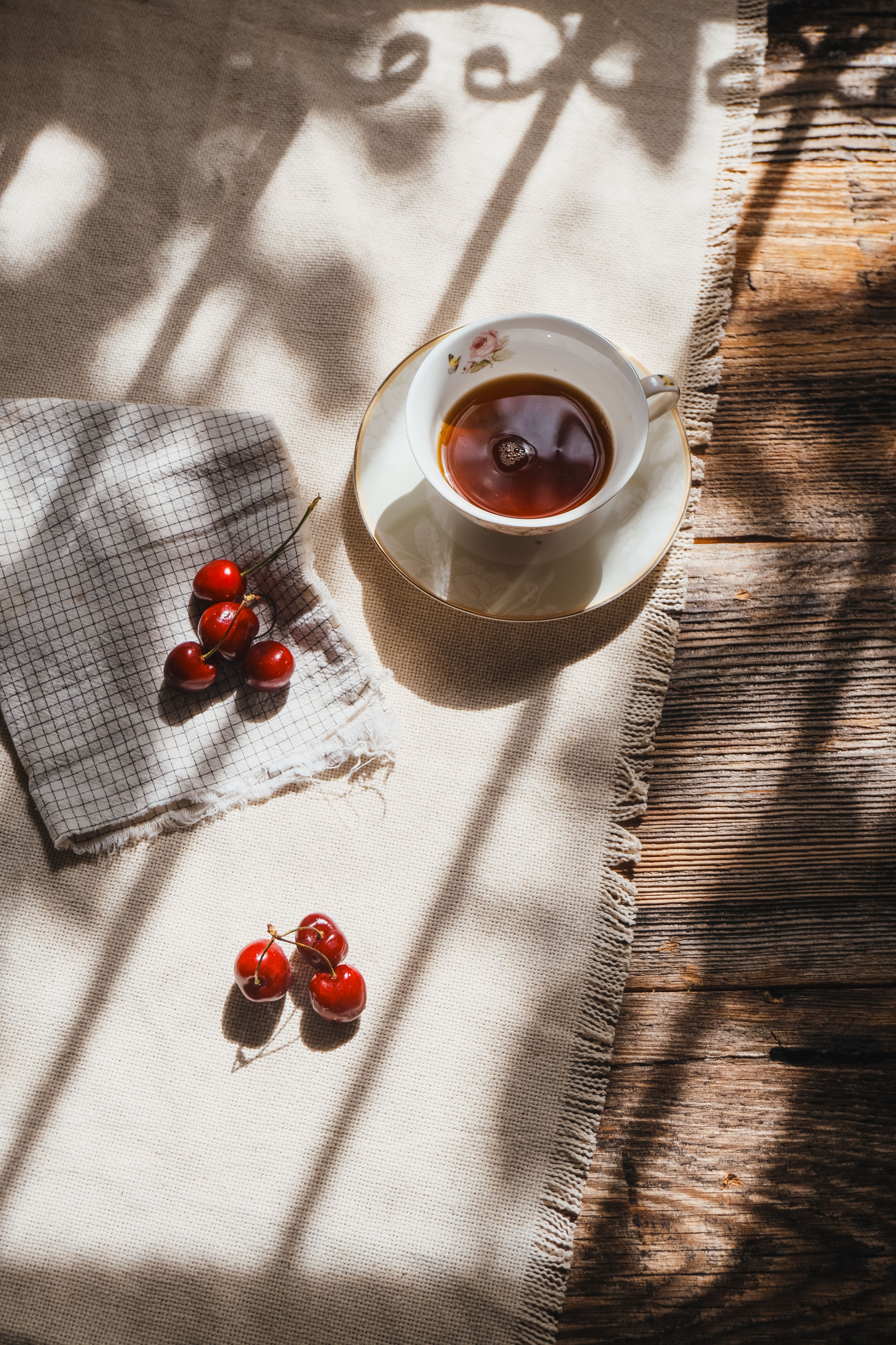 Cherries and Cup of Tea · Free Stock Photo