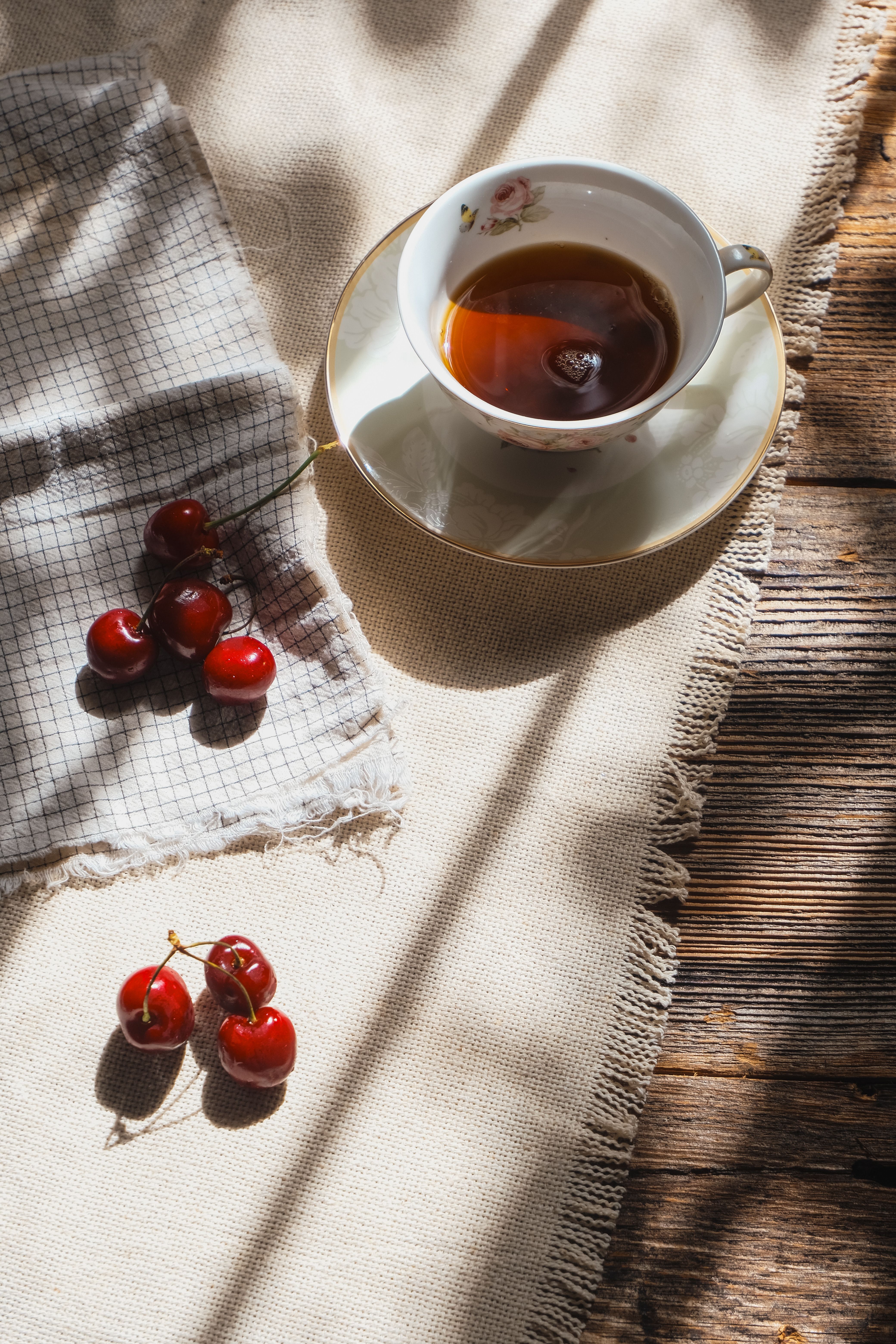 Cherries and Cup of Tea · Free Stock Photo