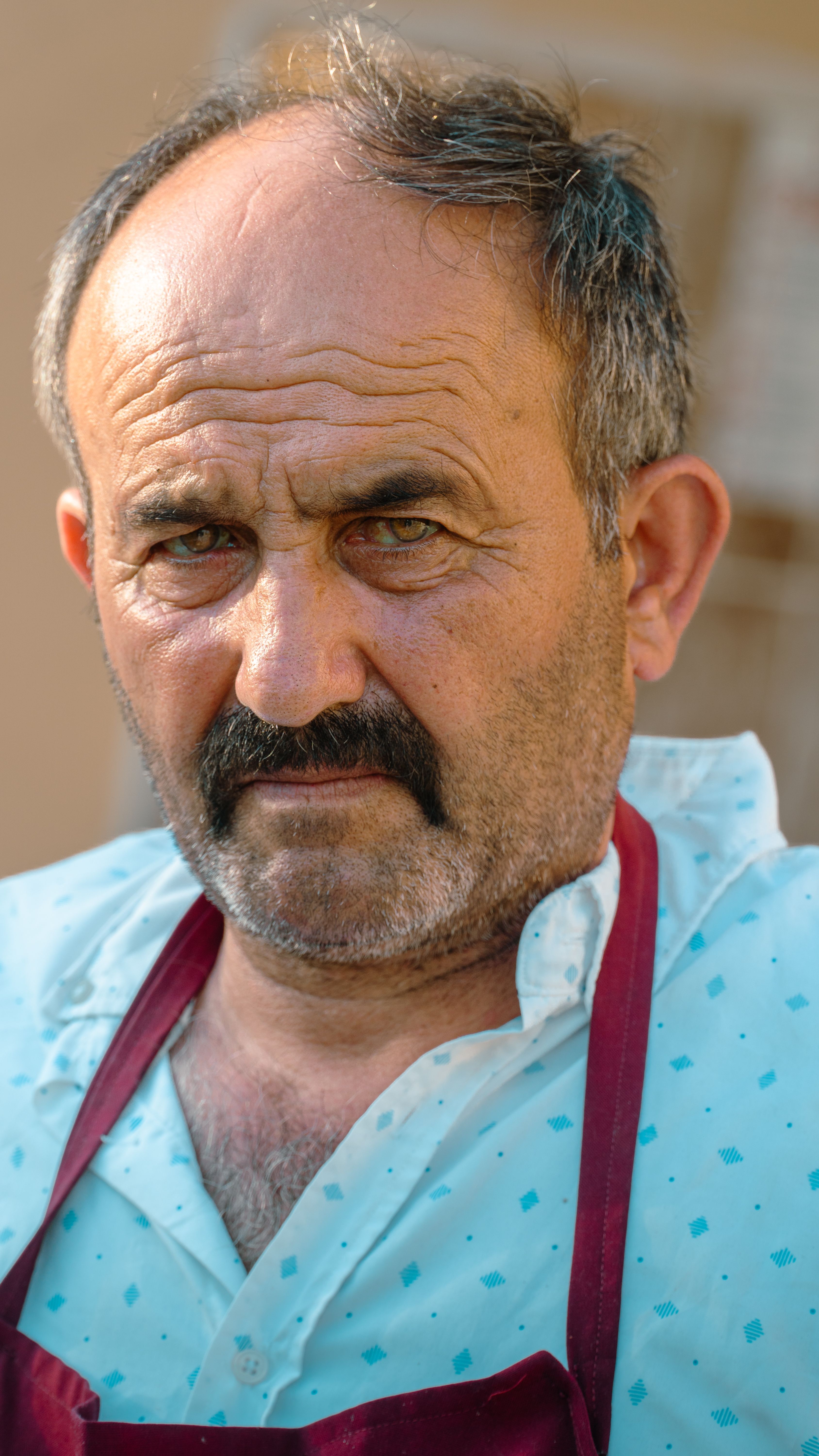 Portrait of a Man Wearing a Mustache · Free Stock Photo