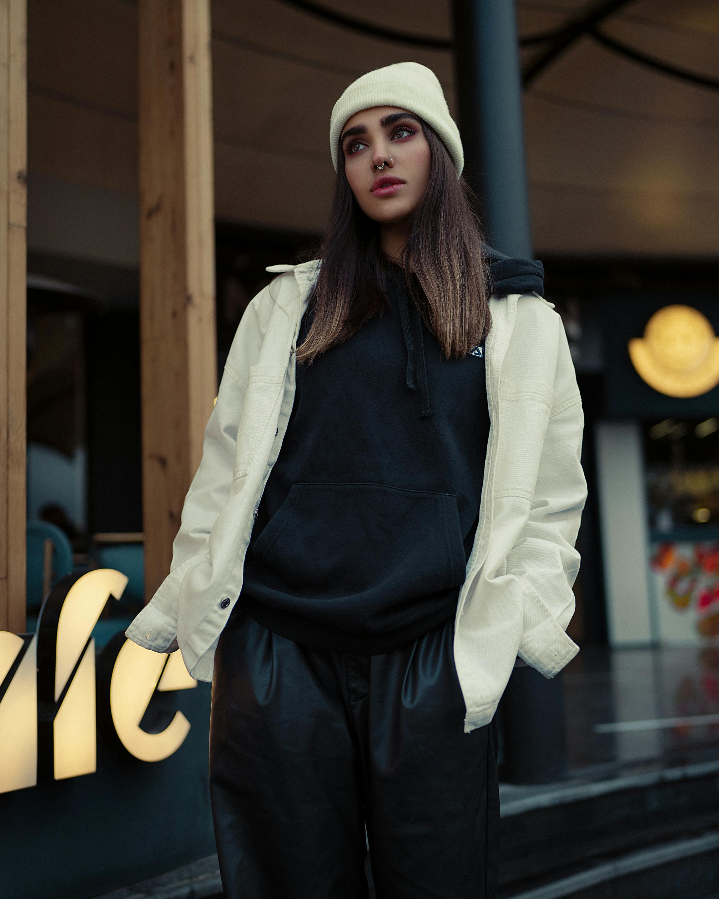 Long-Haired Brunette Wearing Multiple Nose Rings · Free Stock Photo