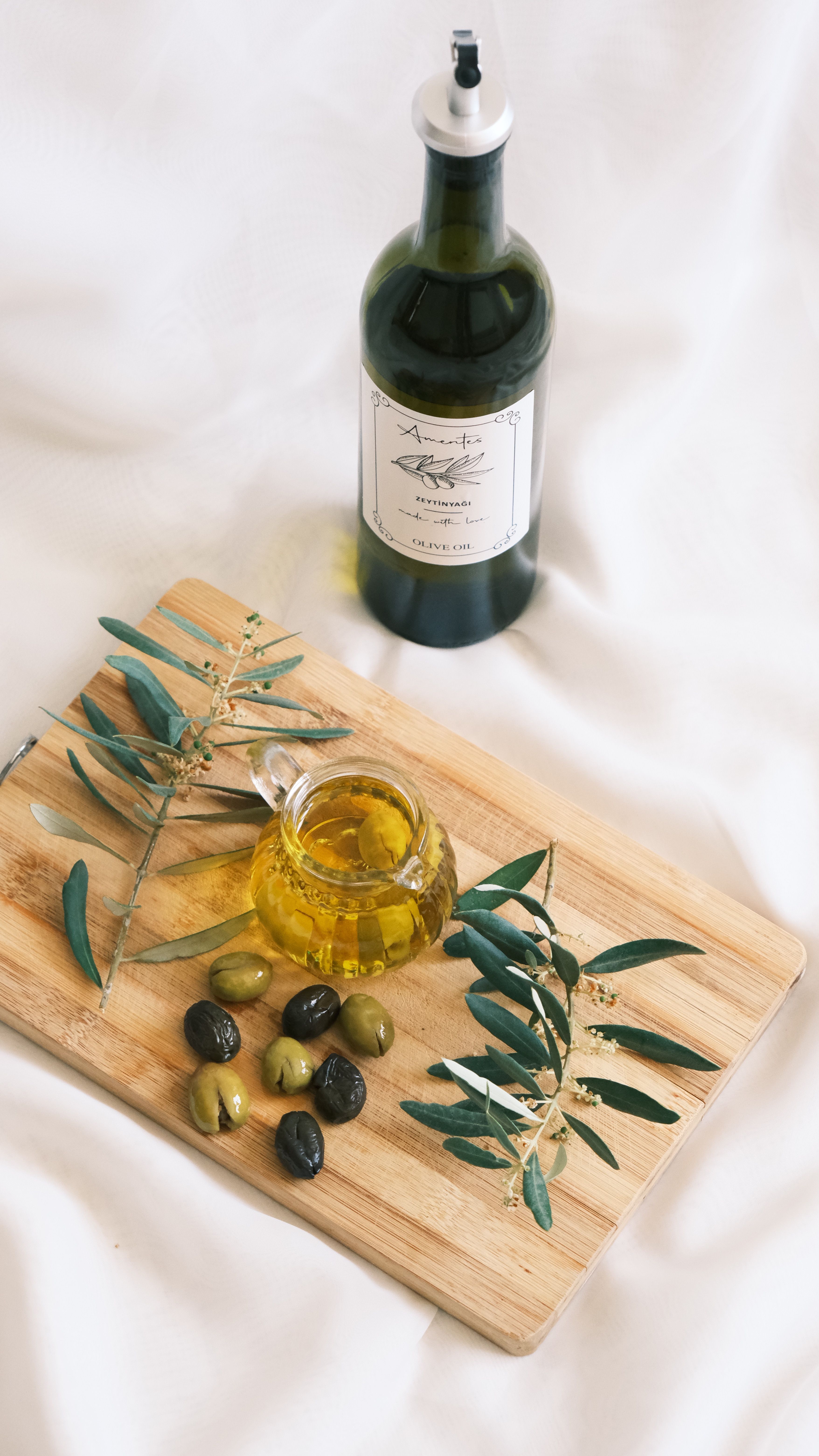 Photo of Olives on Cup of Olive Oil · Free Stock Photo