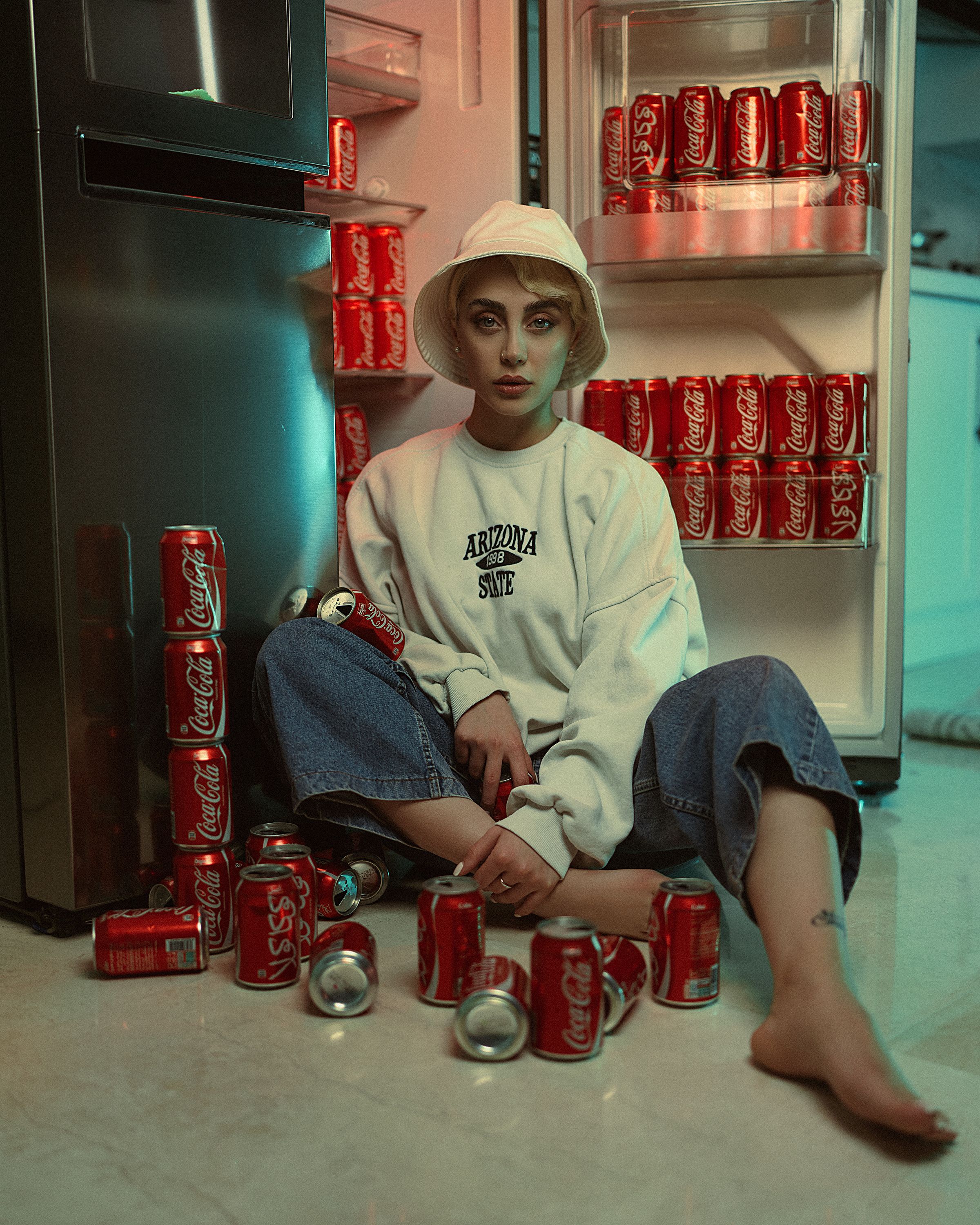 Woman in Front of Fridge Full of Coke · Free Stock Photo
