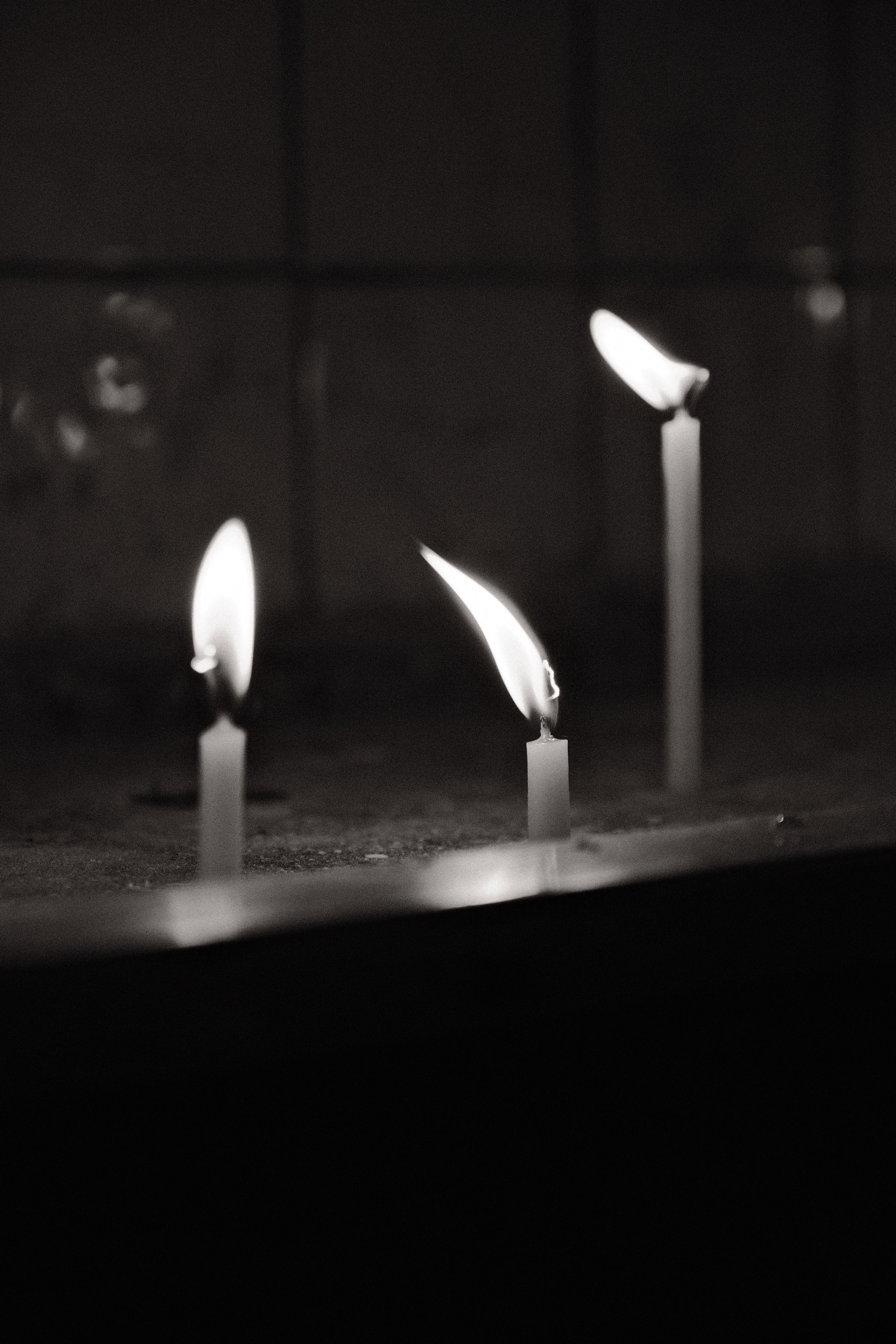 Lightning Candles in Black and White · Free Stock Photo