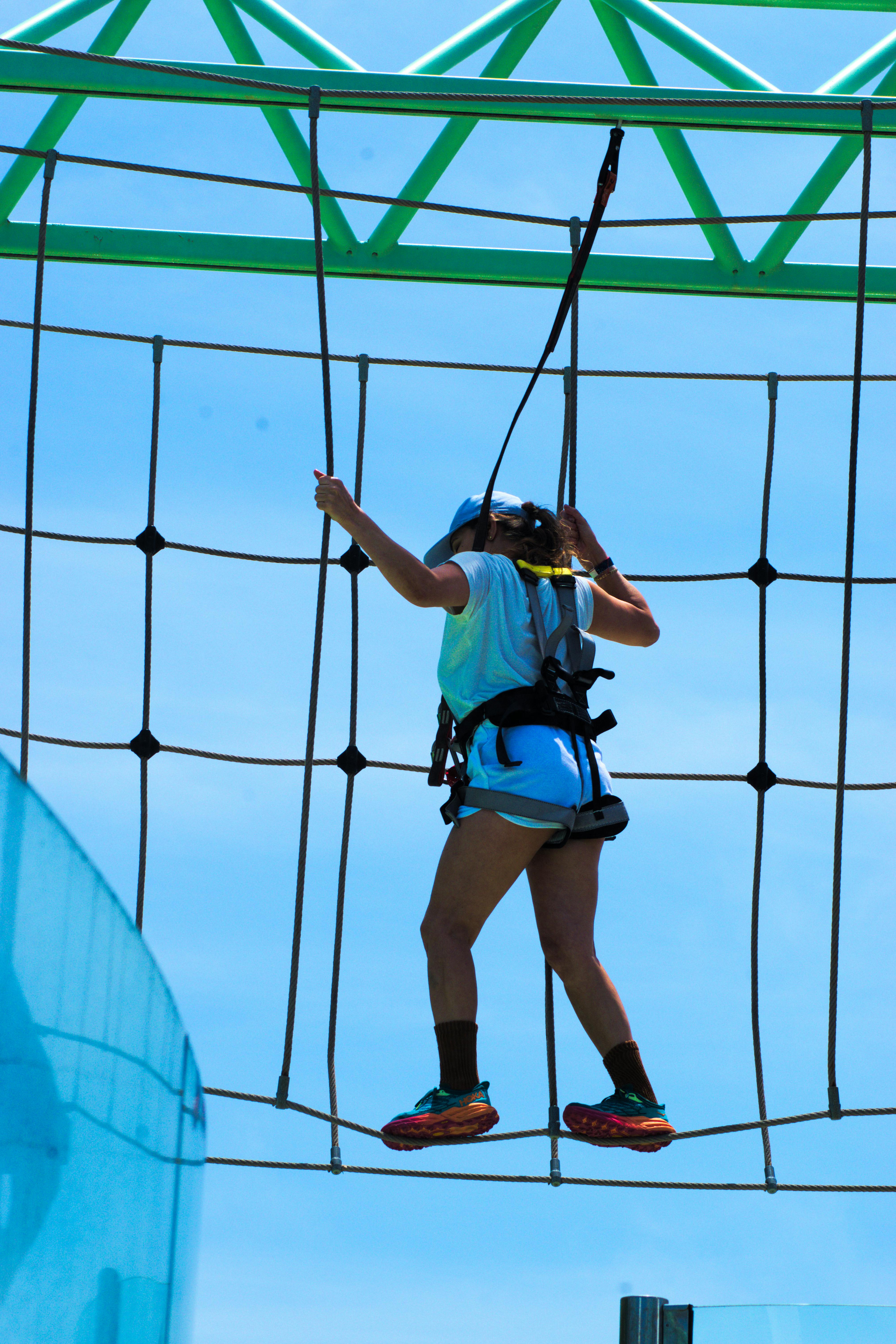 Woman Walking on Ropes on Altitude · Free Stock Photo