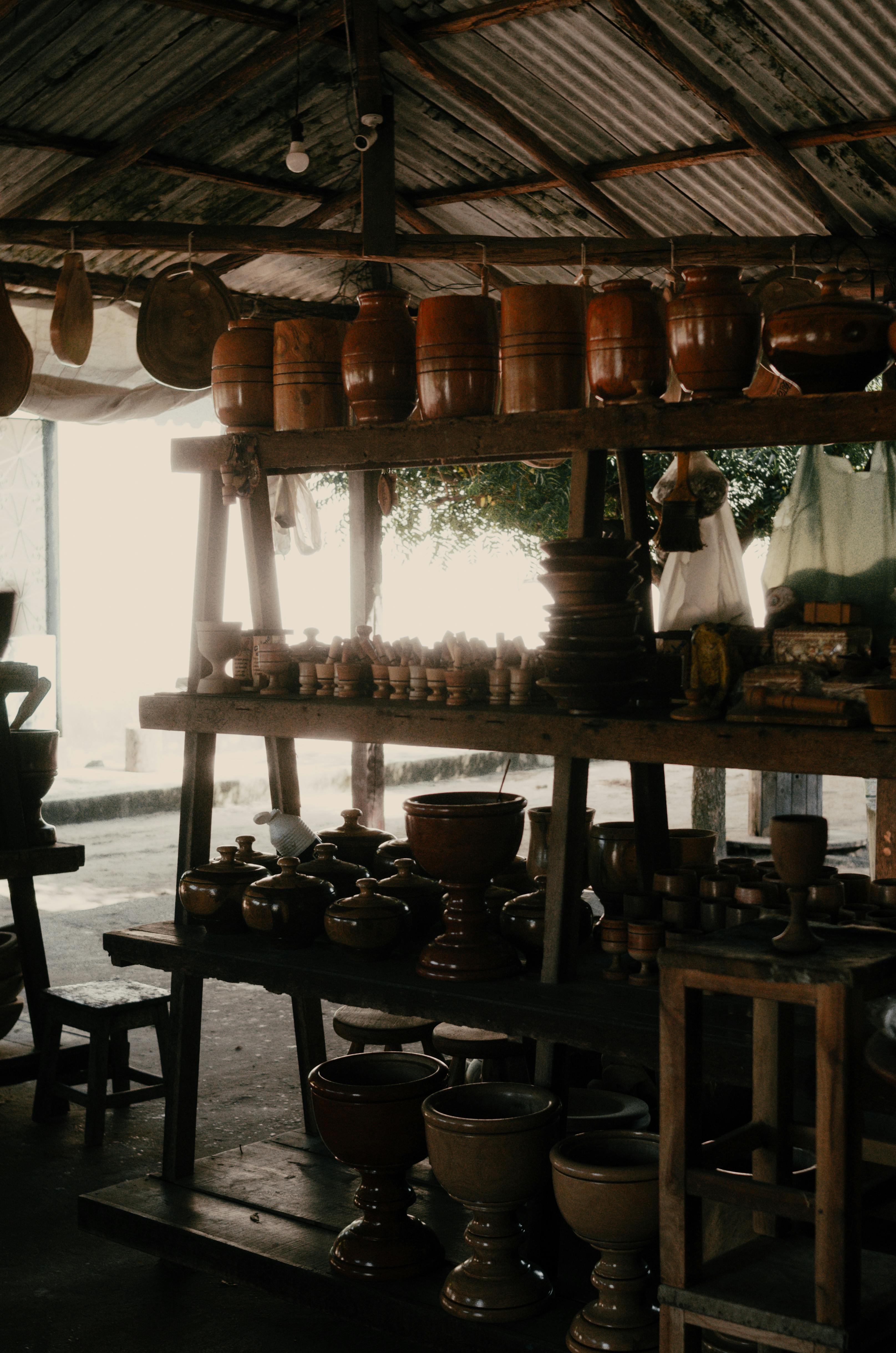Rustic Pottery Shop Interior with Clay Vessels · Free Stock Photo