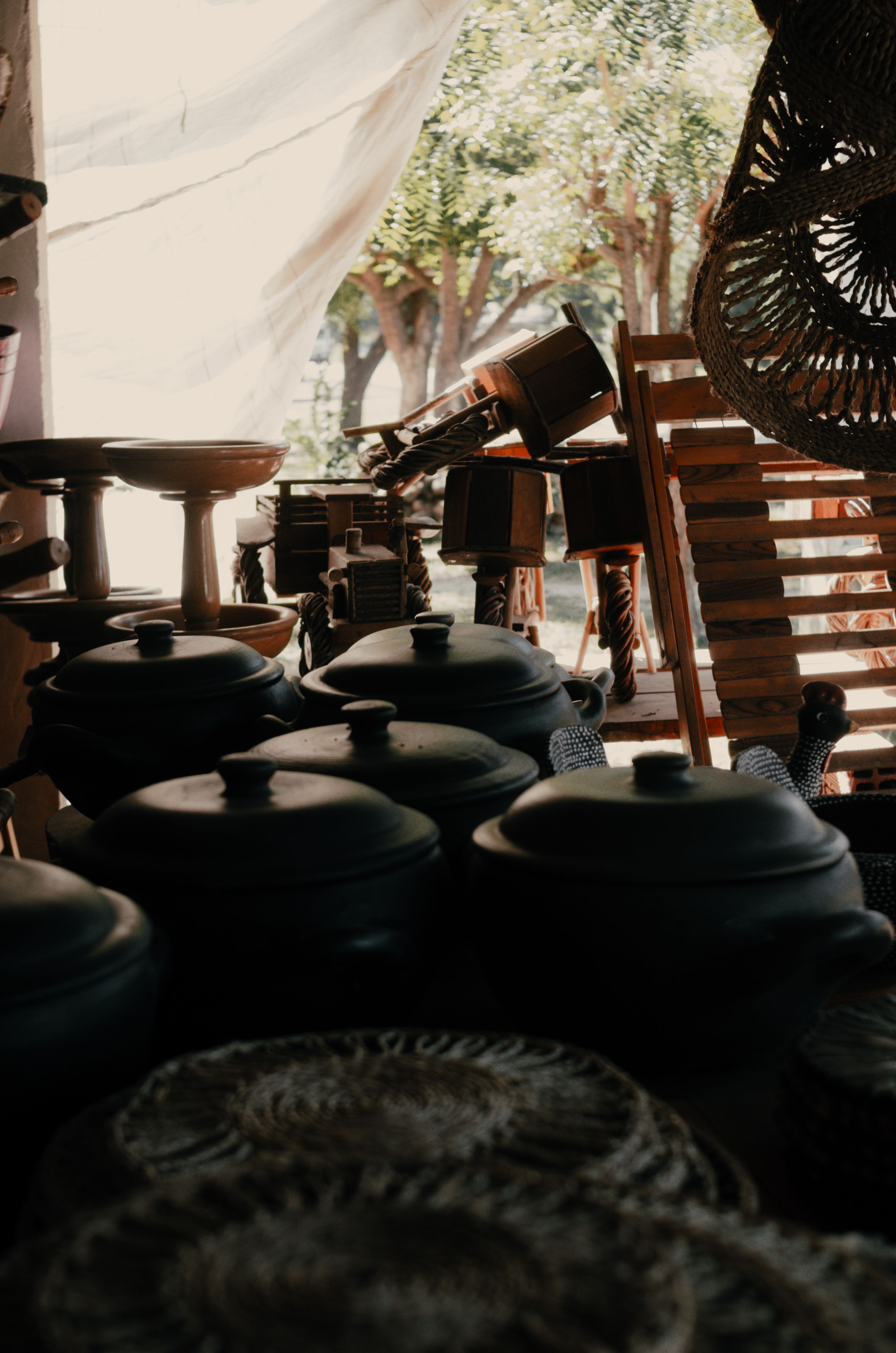 Rustic Market Scene with Pottery and Wickerware · Free Stock Photo