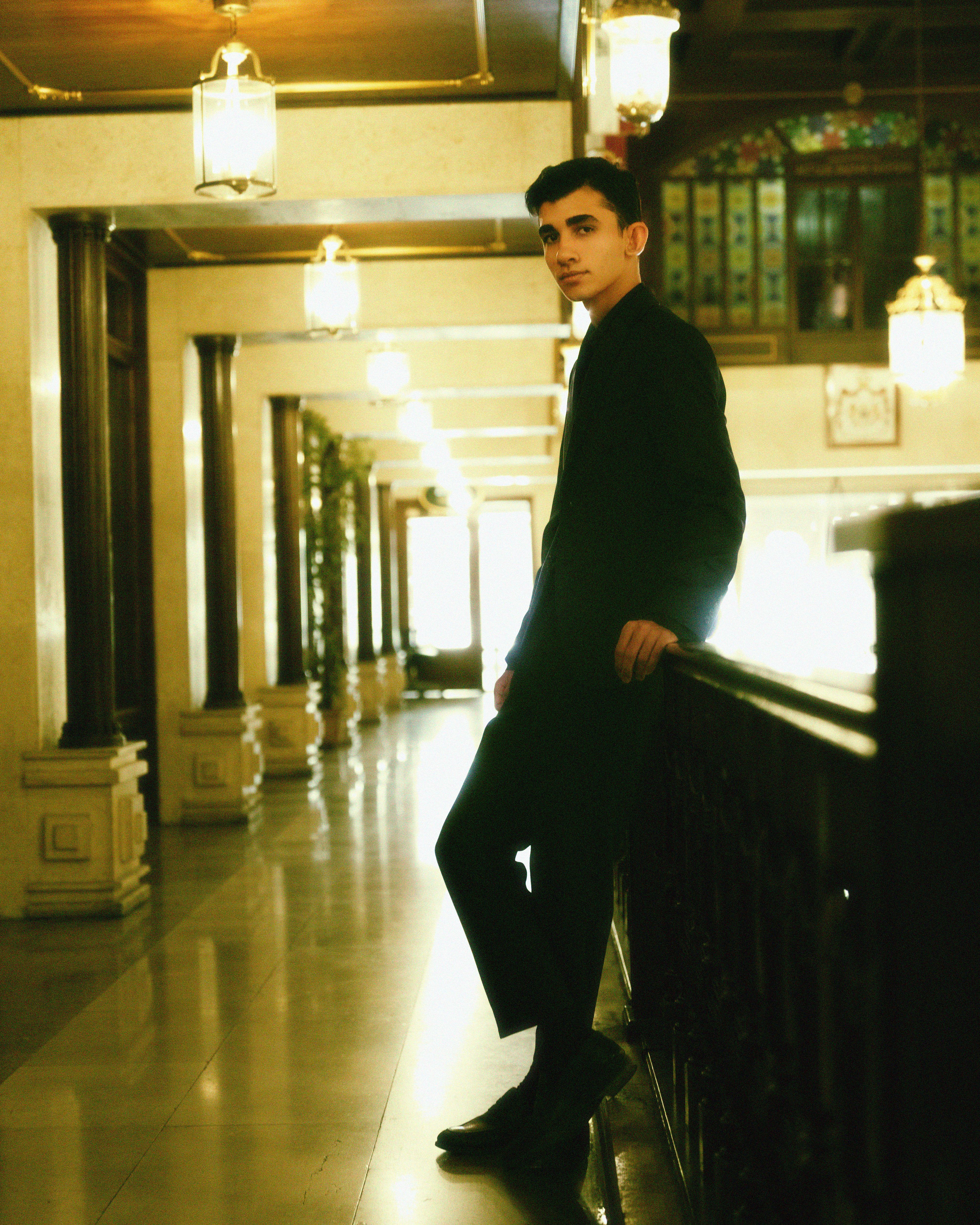 Man Standing in Hallway · Free Stock Photo