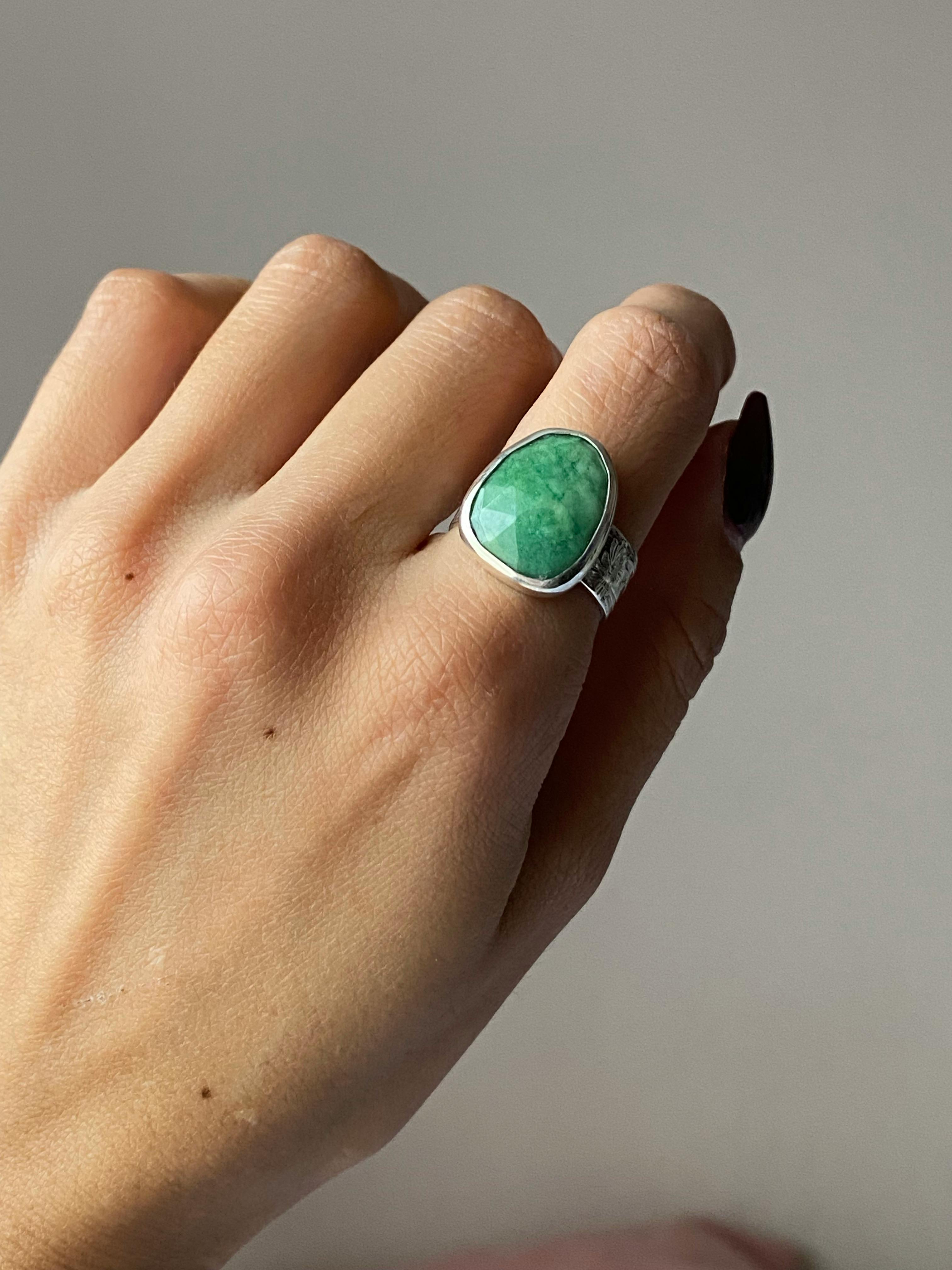 Silver Ring with Large Green Stone on Finger · Free Stock Photo