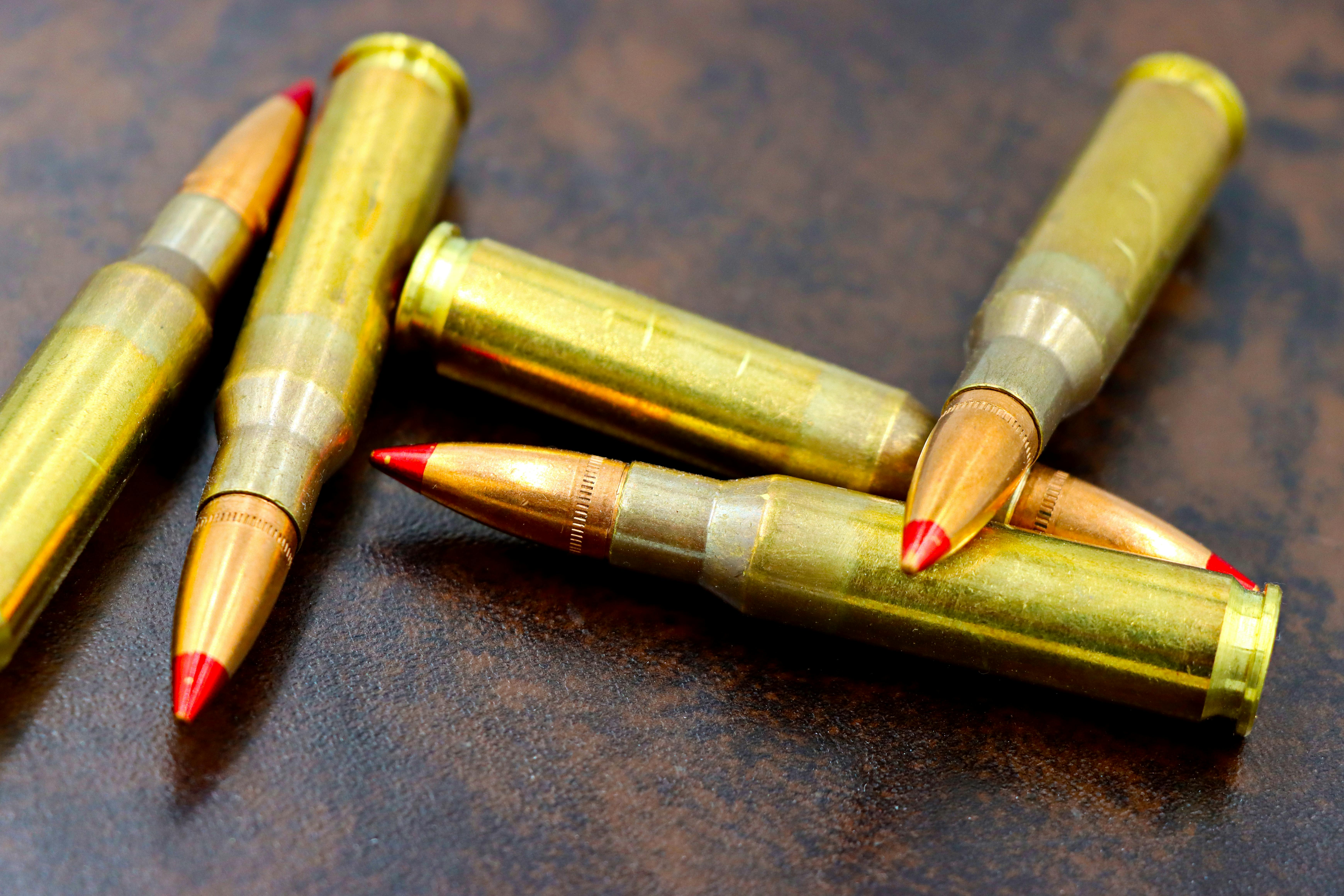 Large Caliber Ammo Rounds with Red Tips · Free Stock Photo