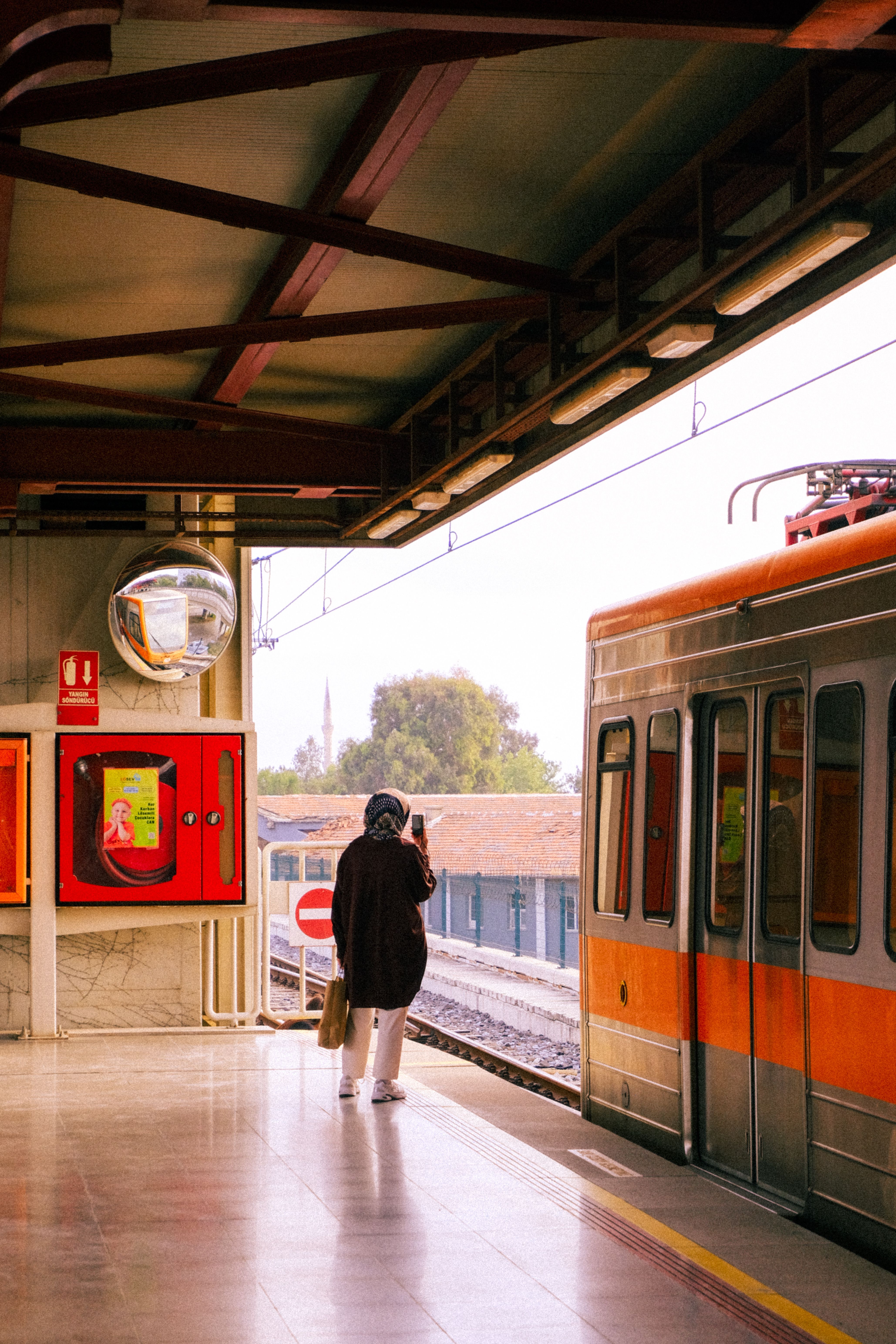 Person Taking Photo at Train Station Platform · Free Stock Photo