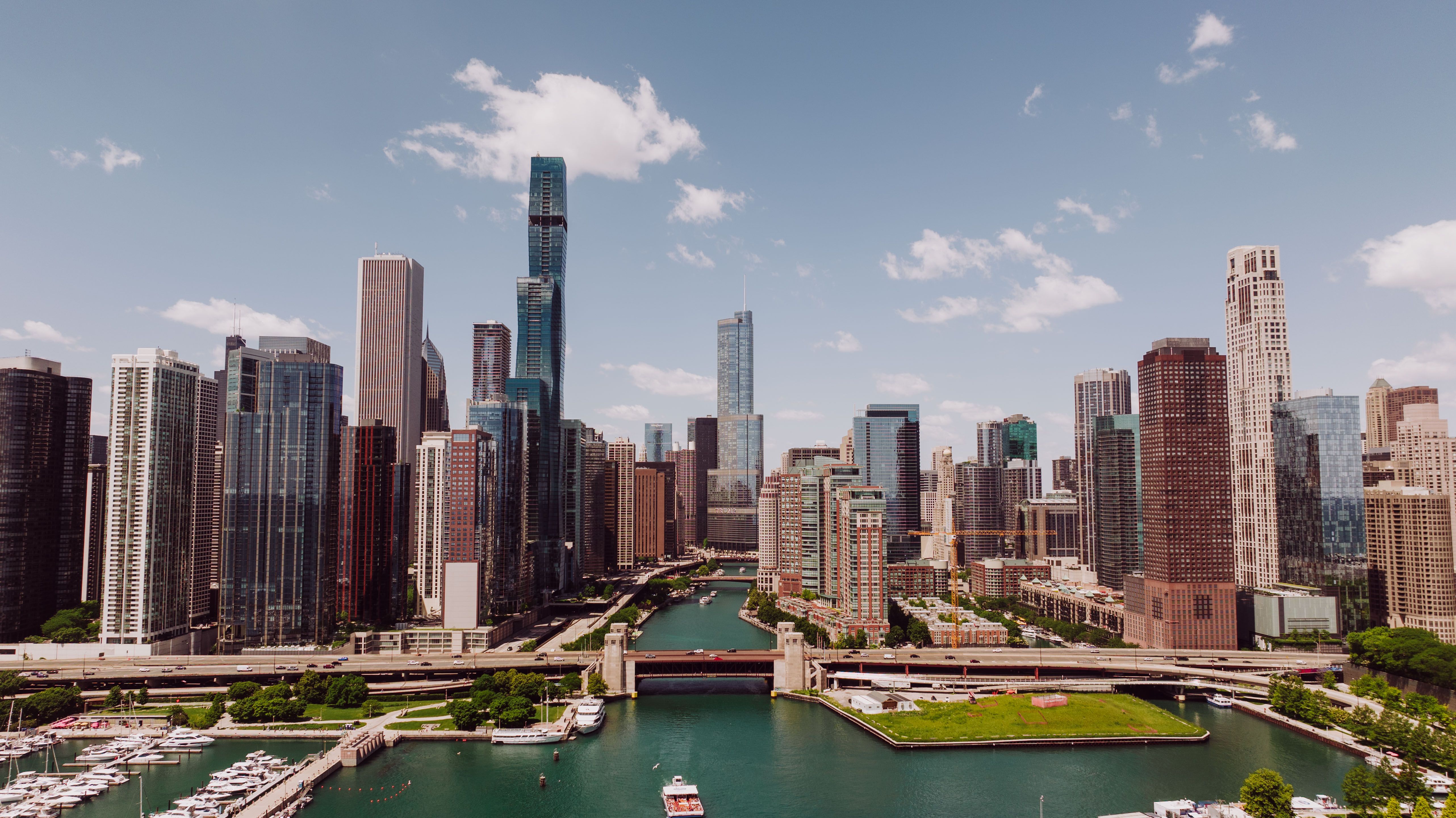 City With River in Middle during Cloudy Day · Free Stock Photo