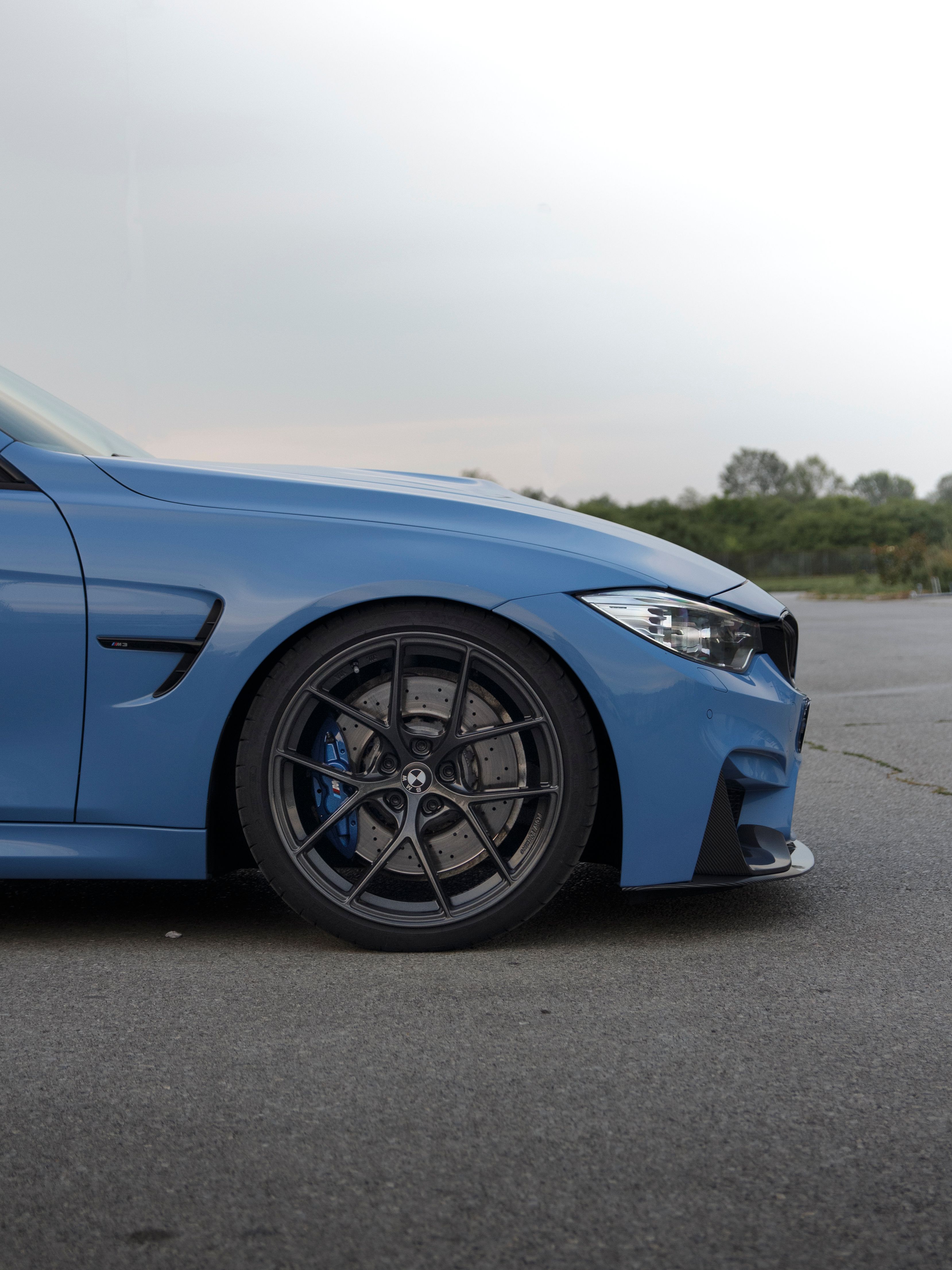 Side View of a Modern, Blue BMW · Free Stock Photo