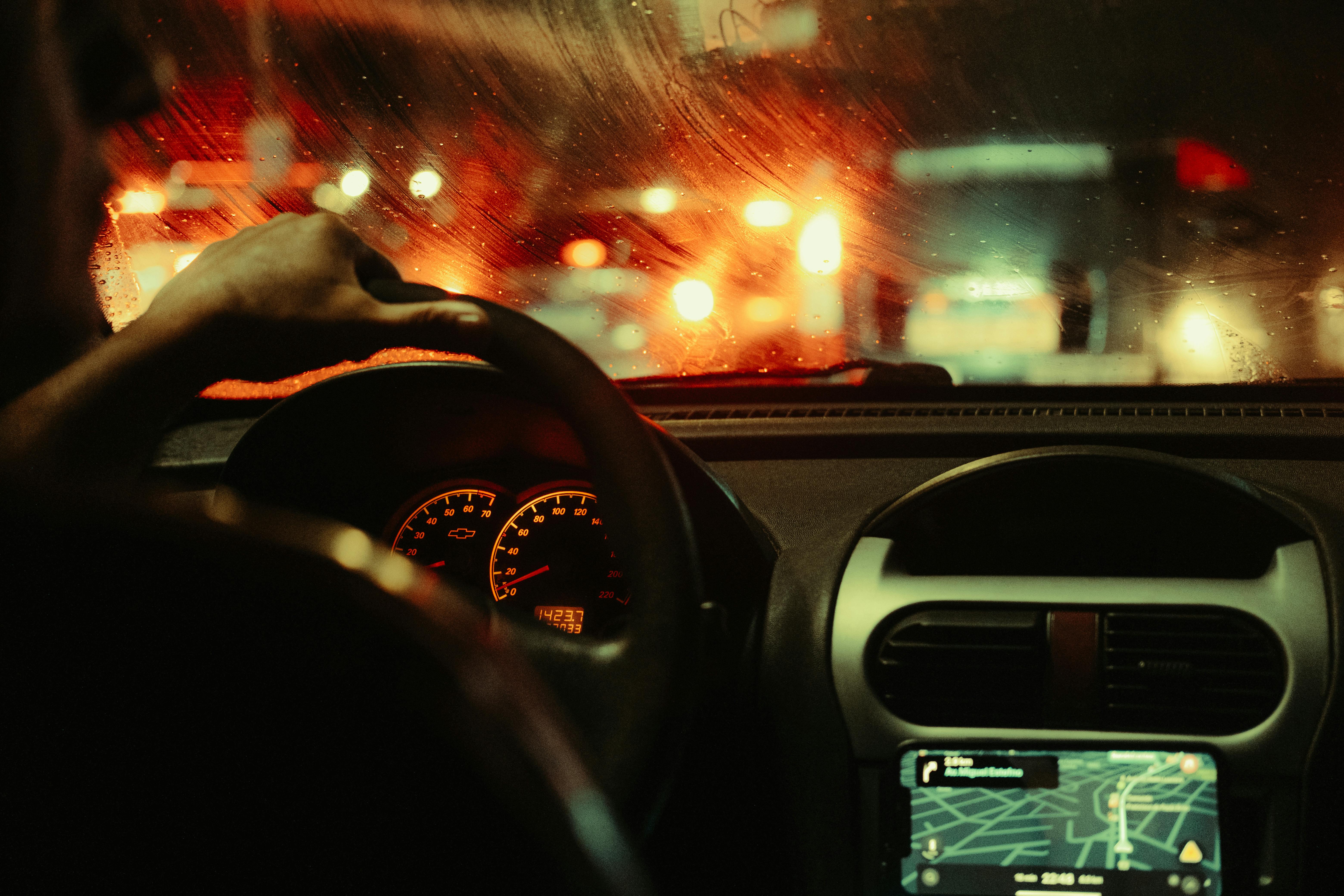 Man Driving Car at Night · Free Stock Photo