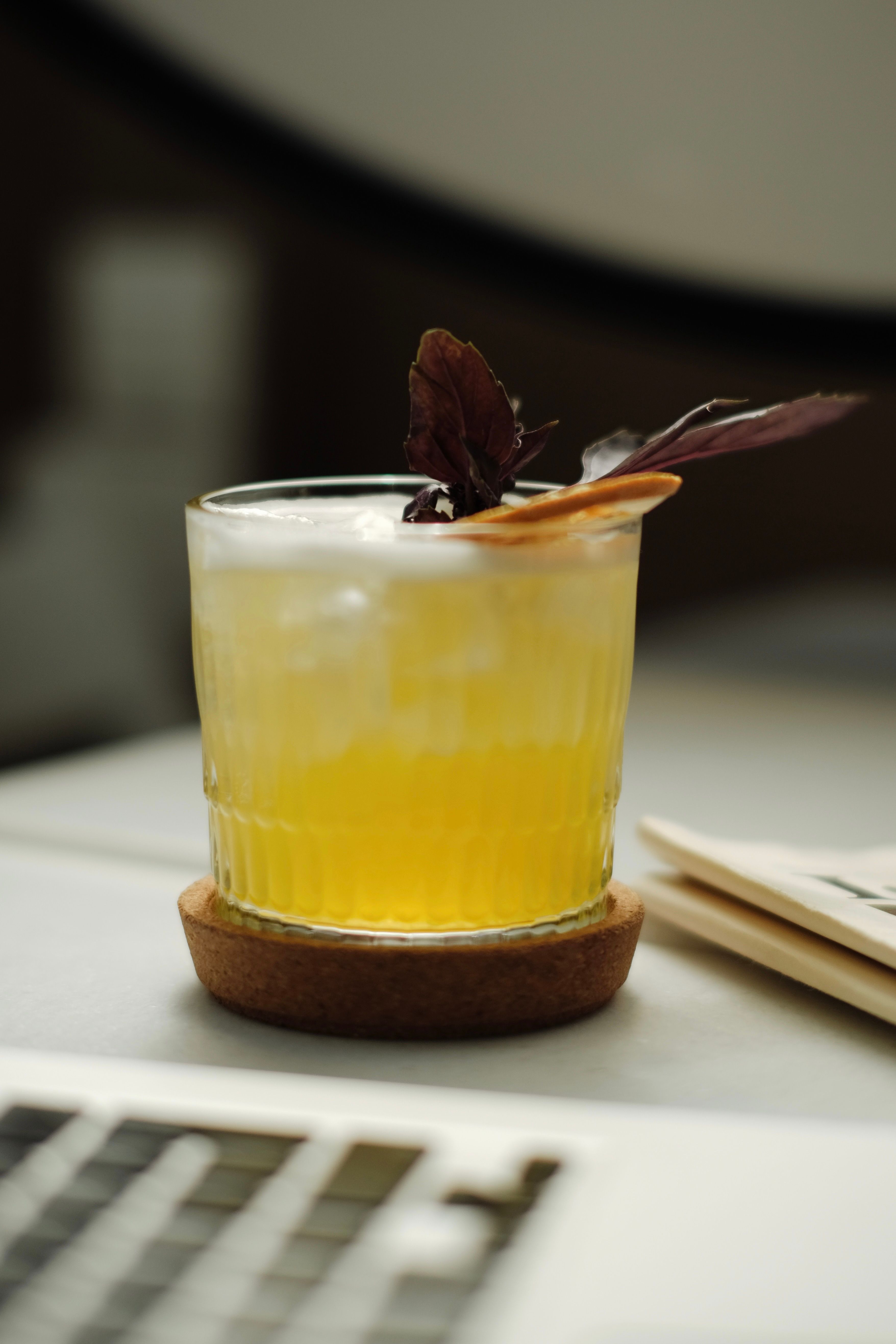 Yellow Drink Served in a Bar · Free Stock Photo