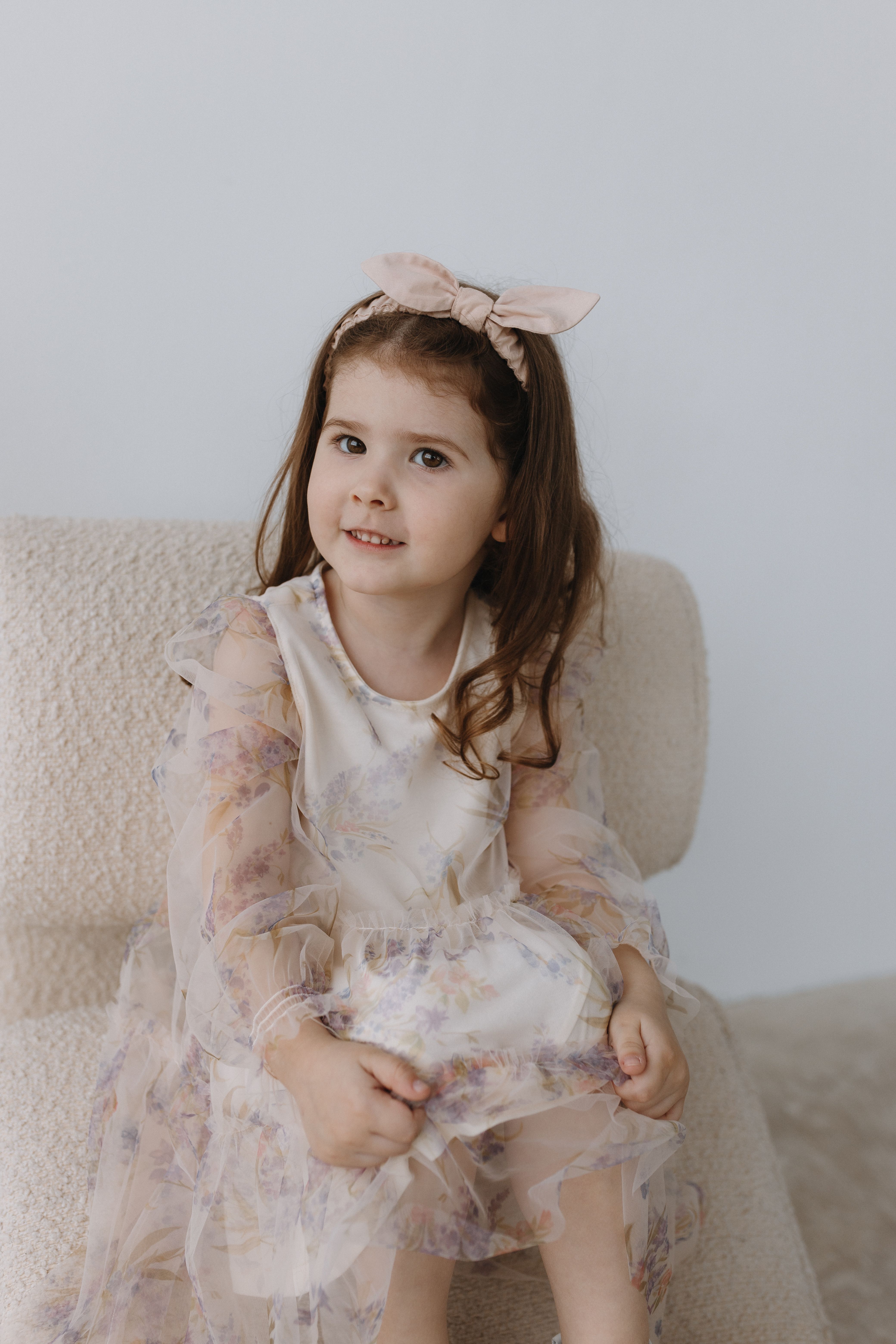 Girl Sitting in Dress · Free Stock Photo