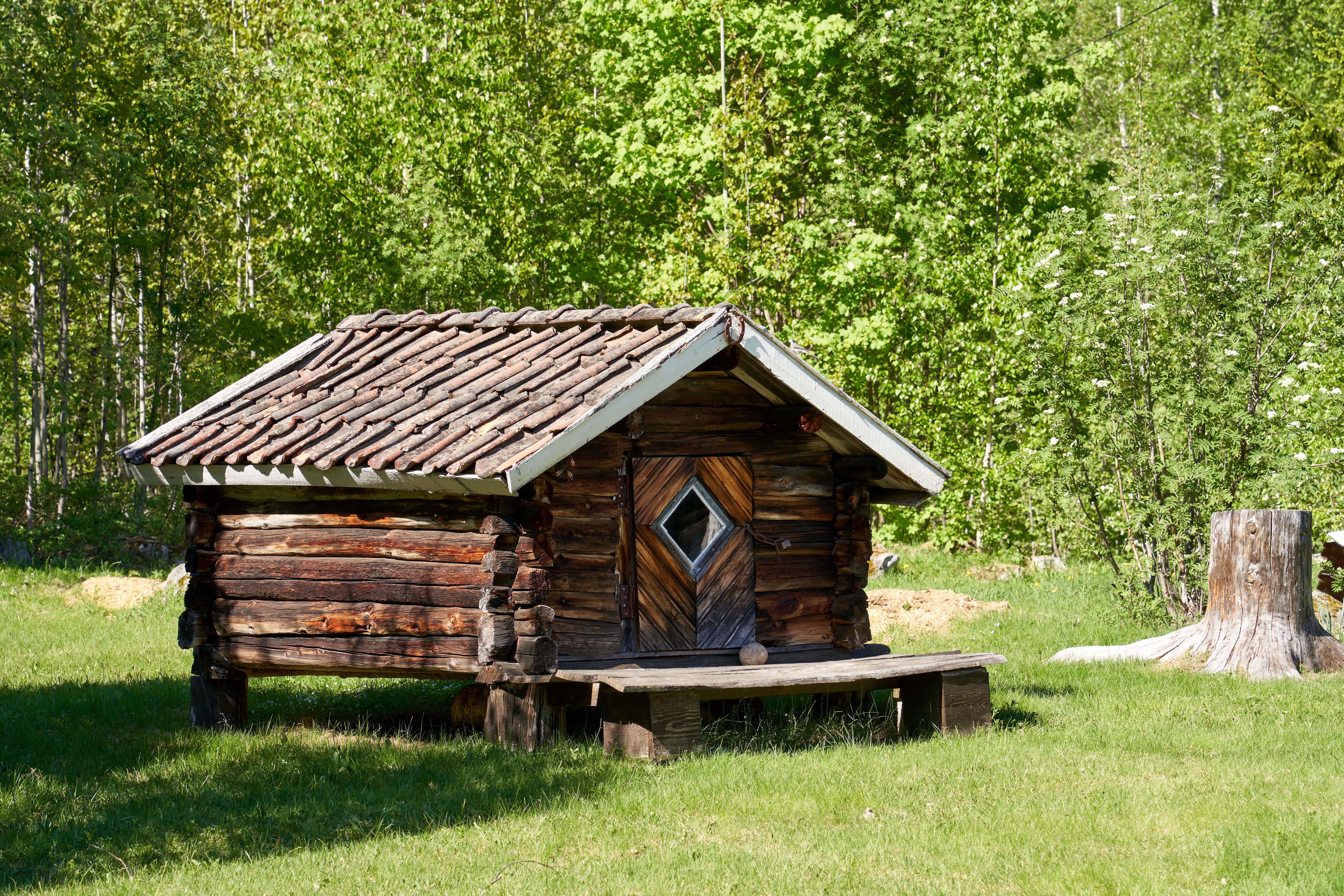 Play house built in the style of a Norwegian log house, close to a ...