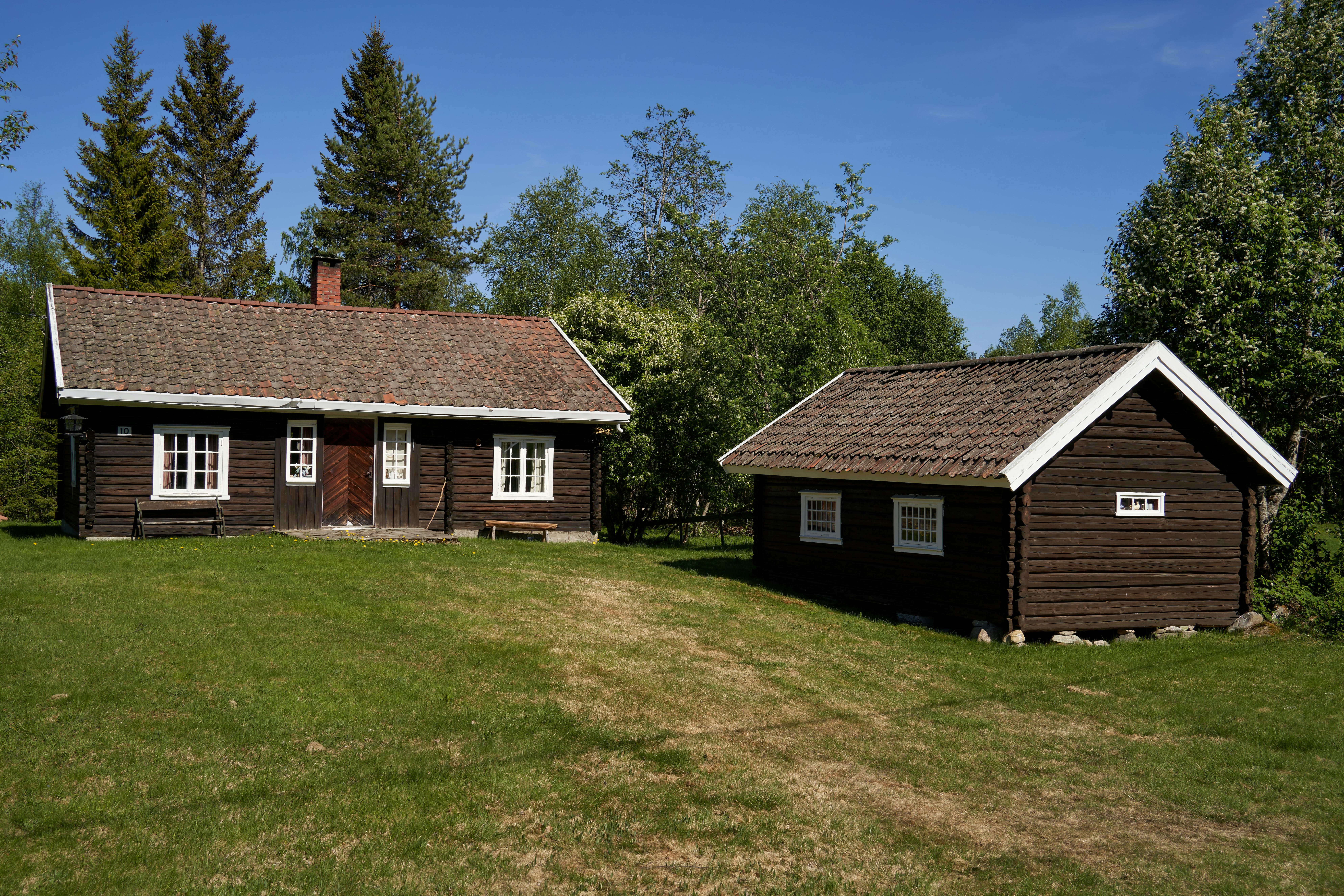 Beautiful traditional log house used as a cabin in the Norwegian wood ...