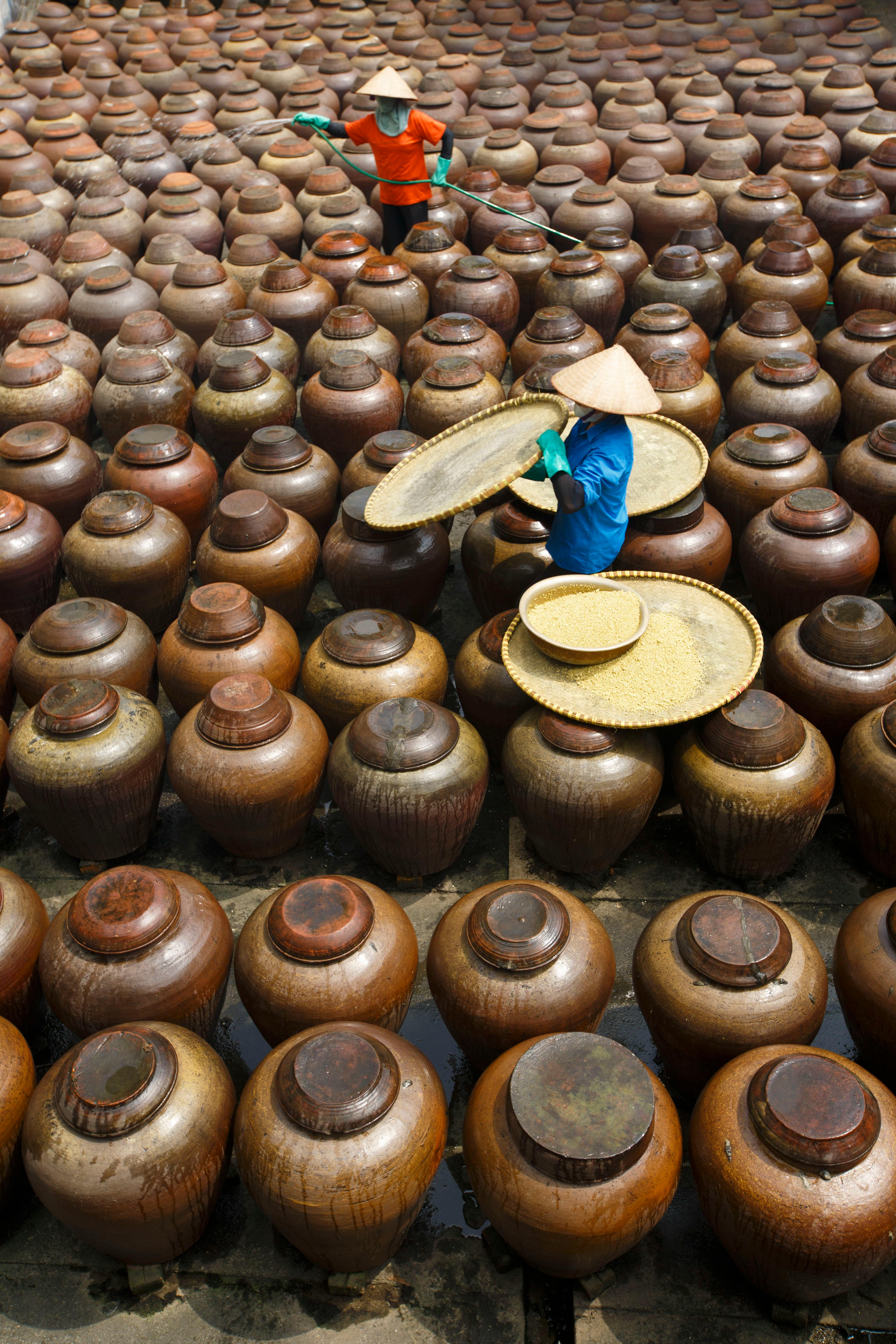 People Washing Jars · Free Stock Photo