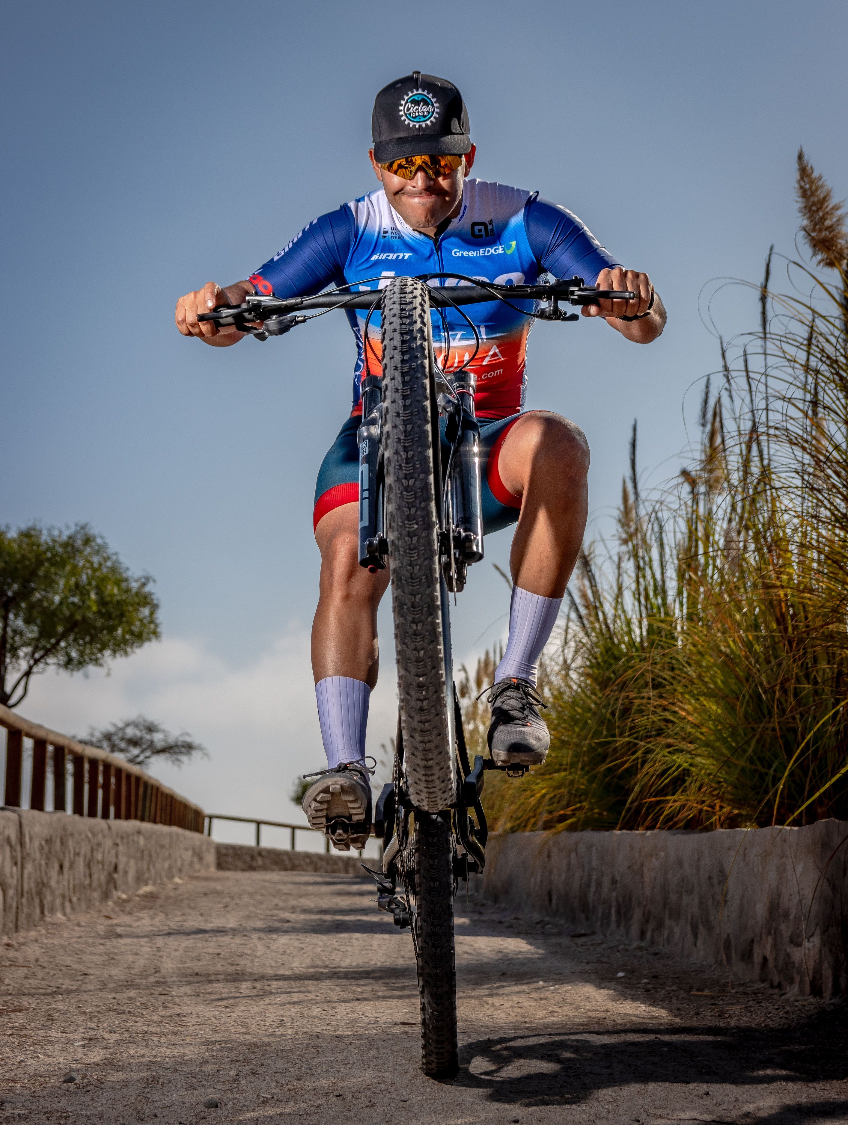 Man Standing on Mountain Bike · Free Stock Photo