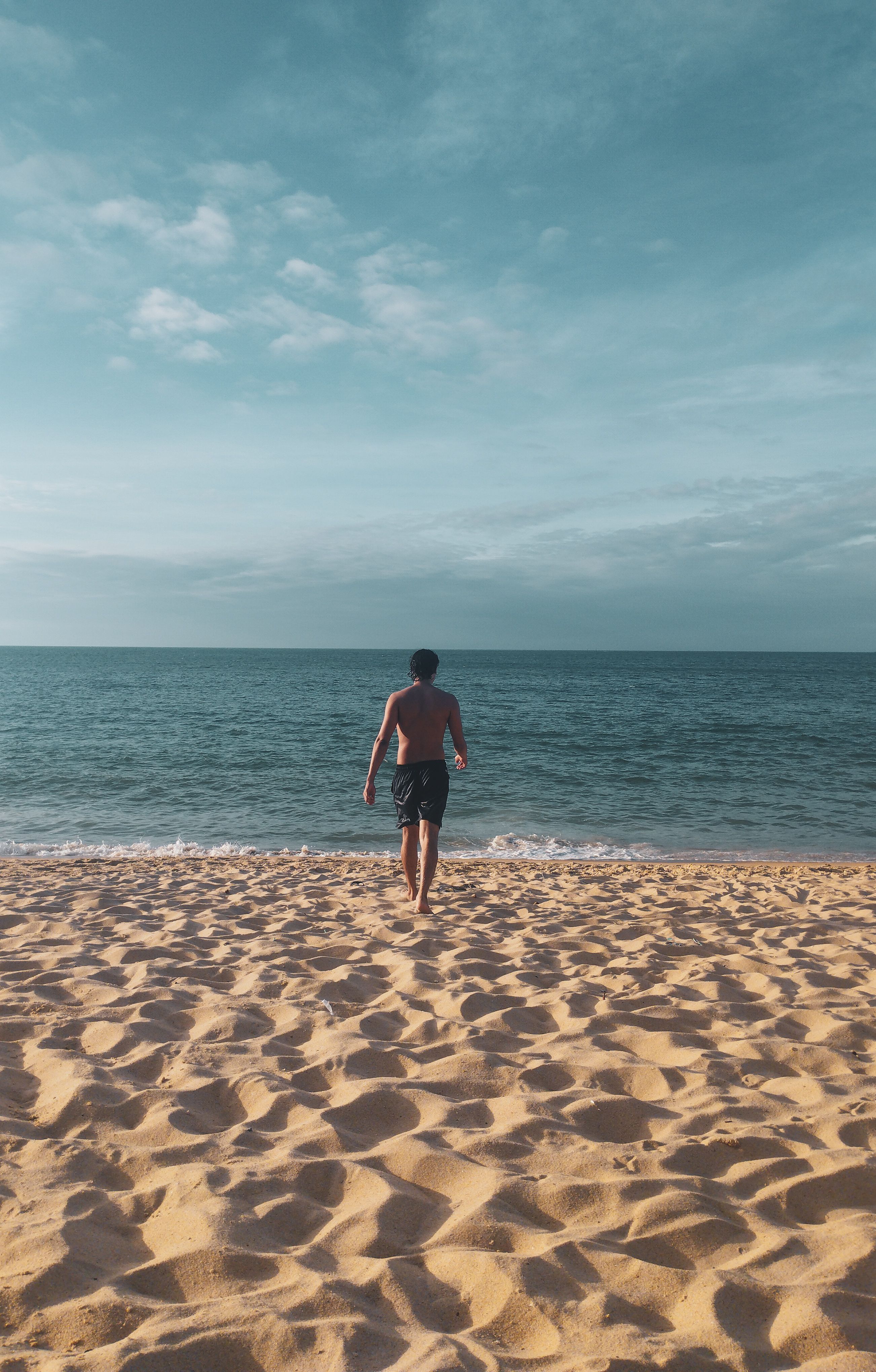 Man on a Sunny Beach · Free Stock Photo