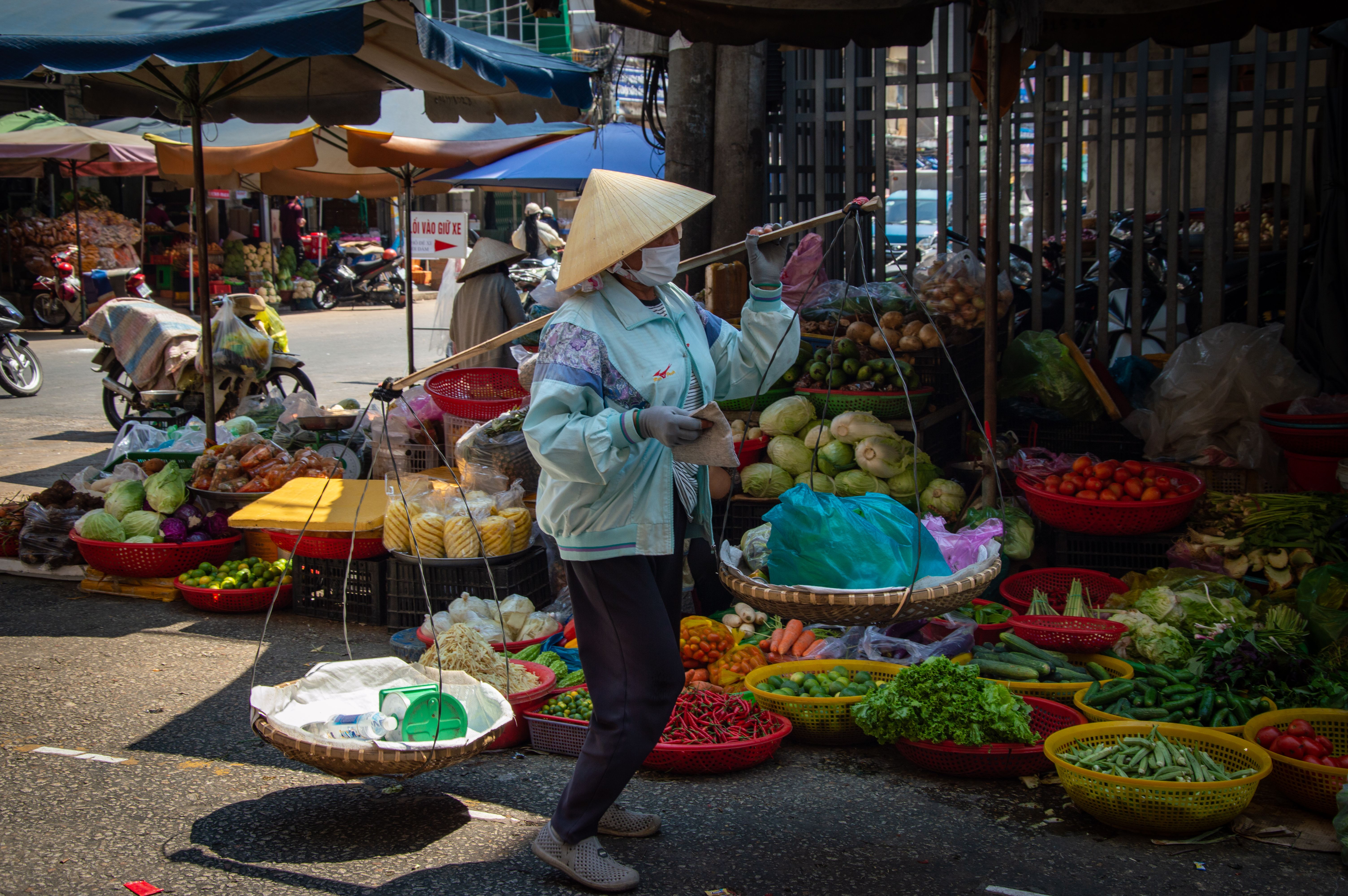 Woman on a Food Market in Asia · Free Stock Photo