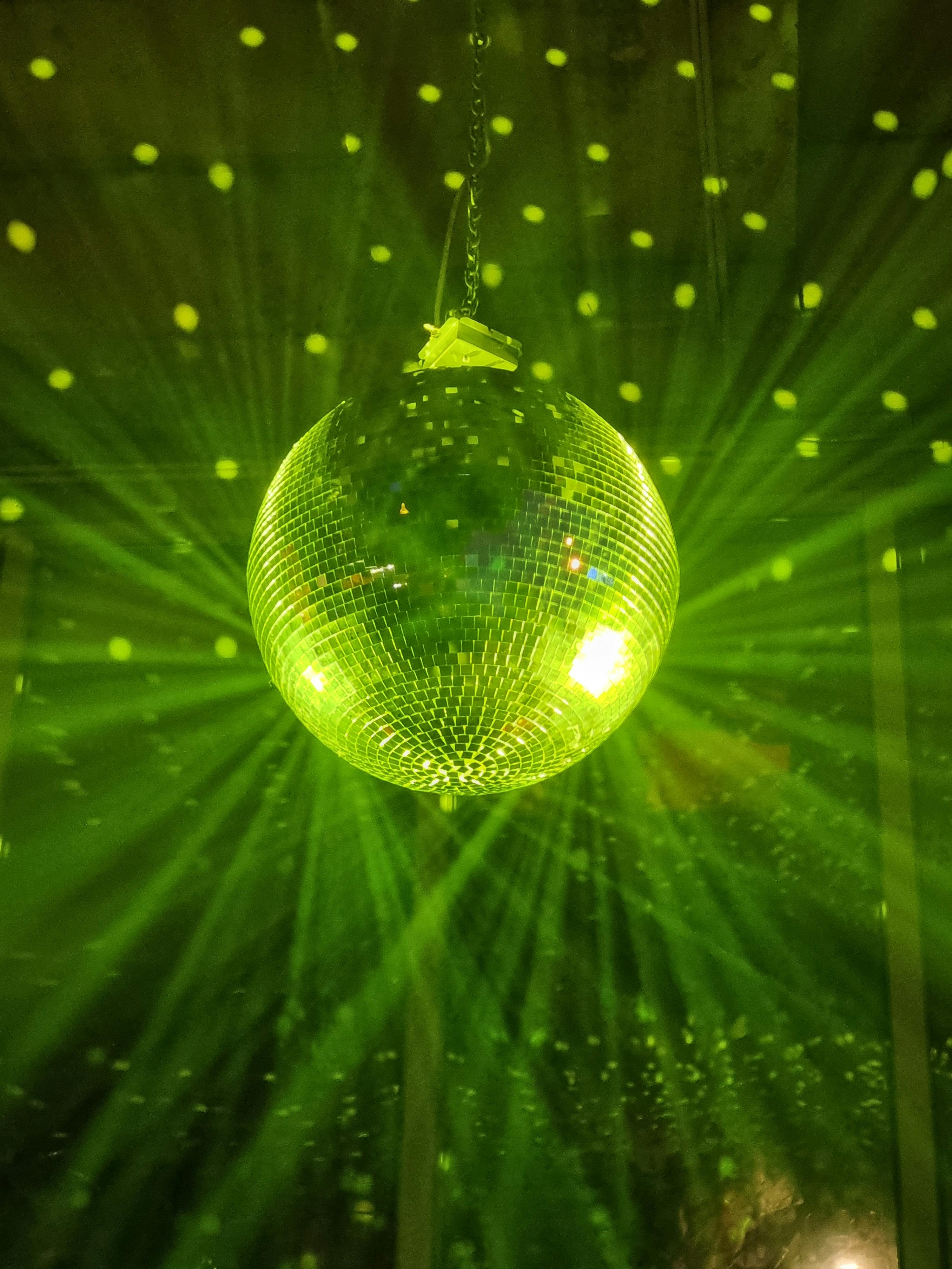 Gray Disco Ball on Brown Wooden Surface · Free Stock Photo