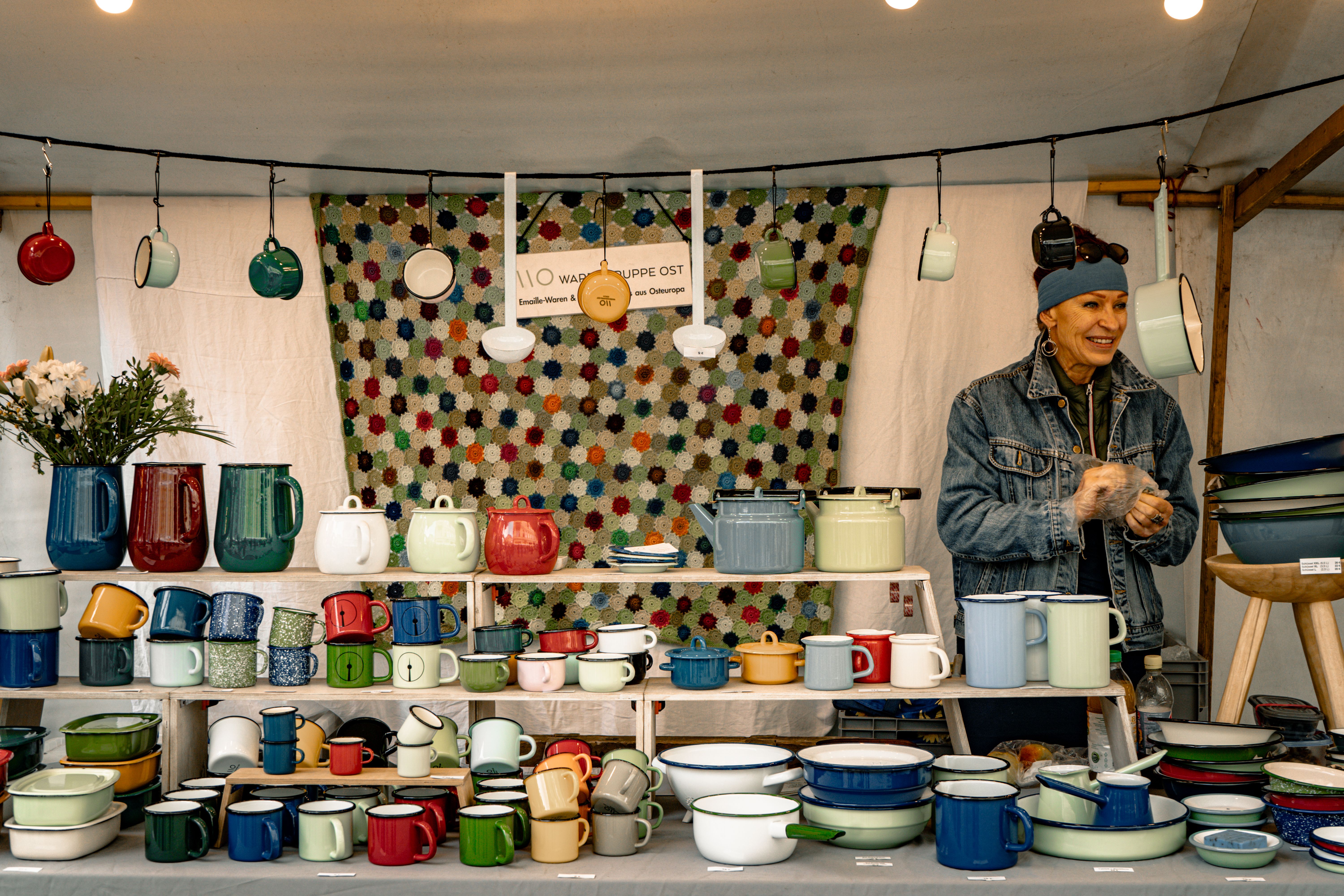 A Woman Selling Pottery at the Market · Free Stock Photo