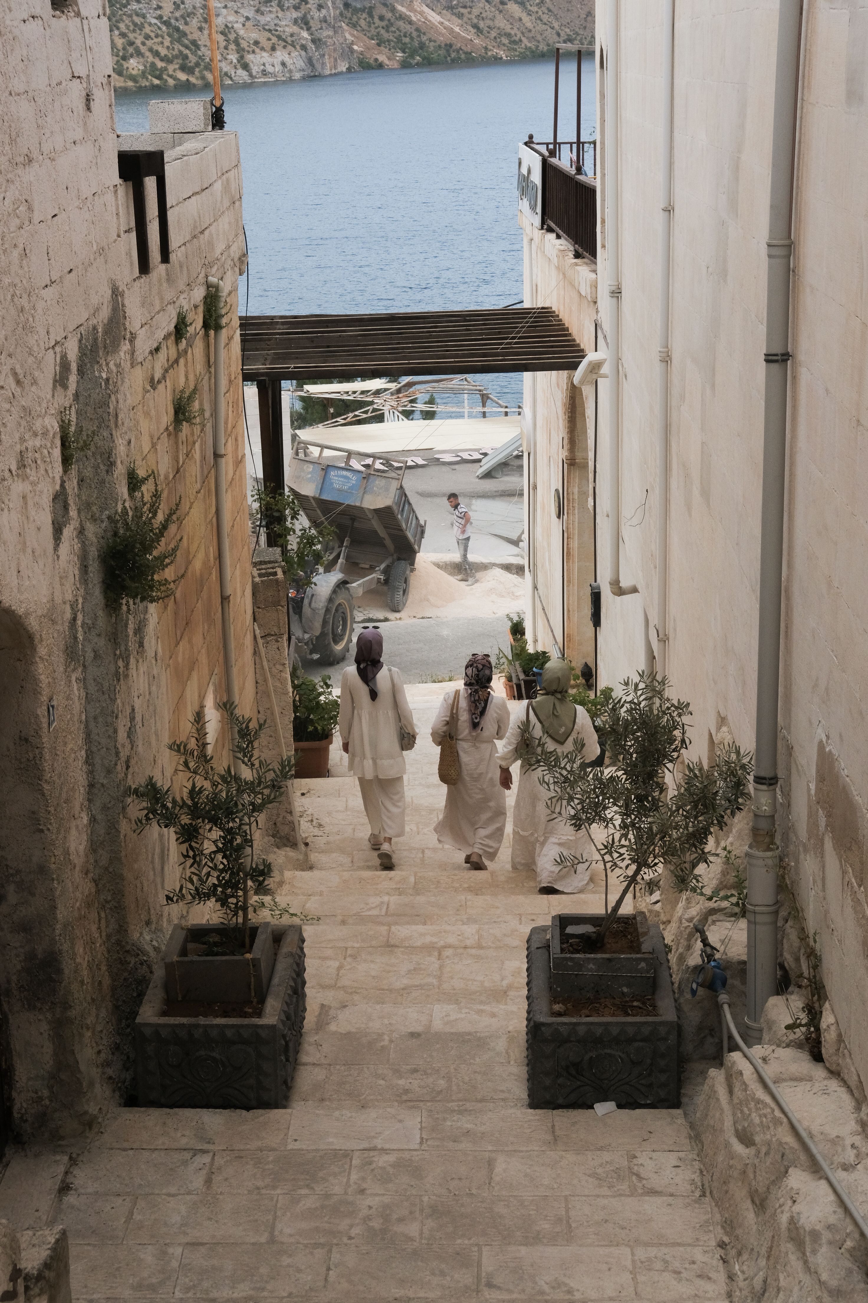 Men with Gowns in a Narrow Alley · Free Stock Photo