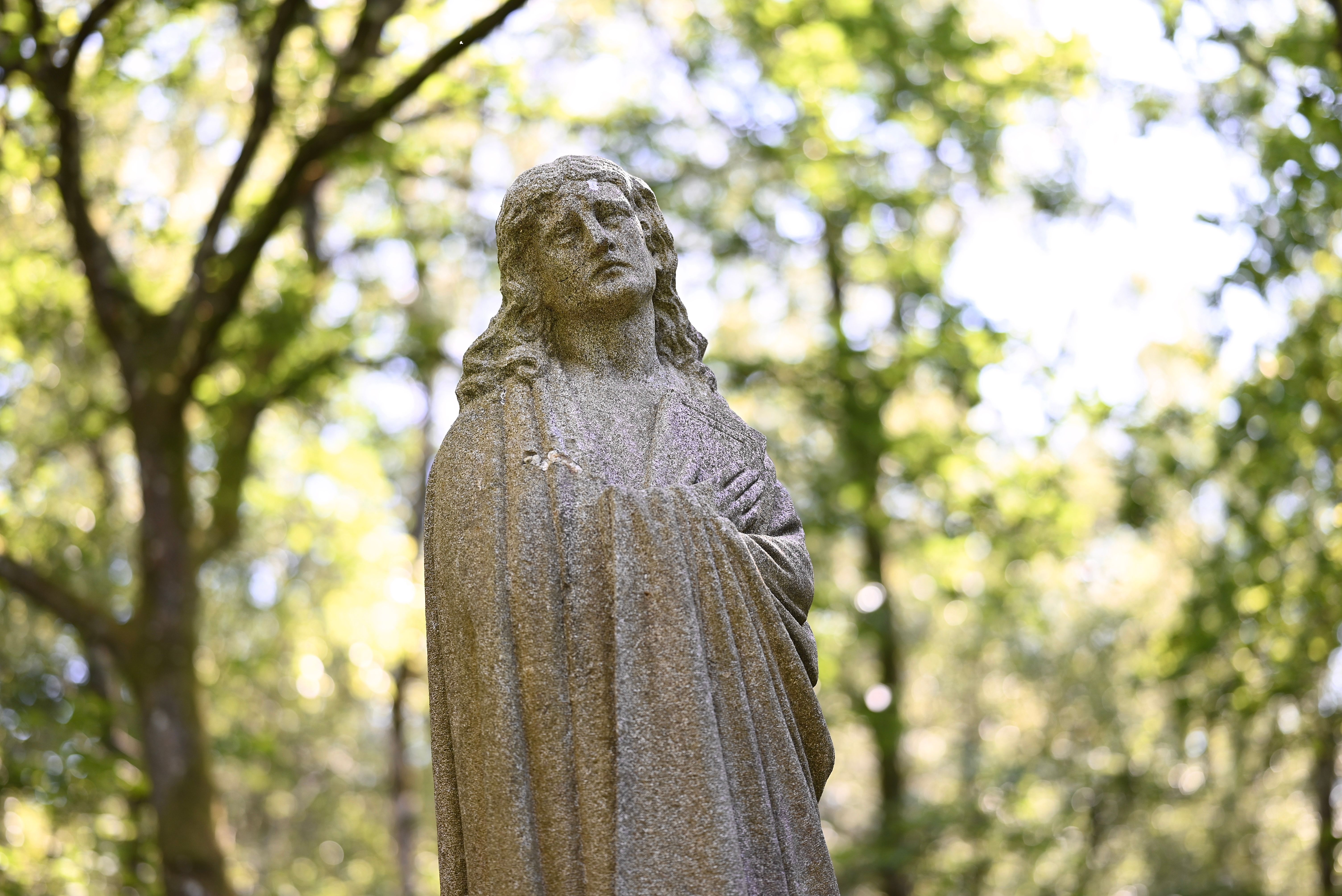 Stone Religious Statue in Park · Free Stock Photo