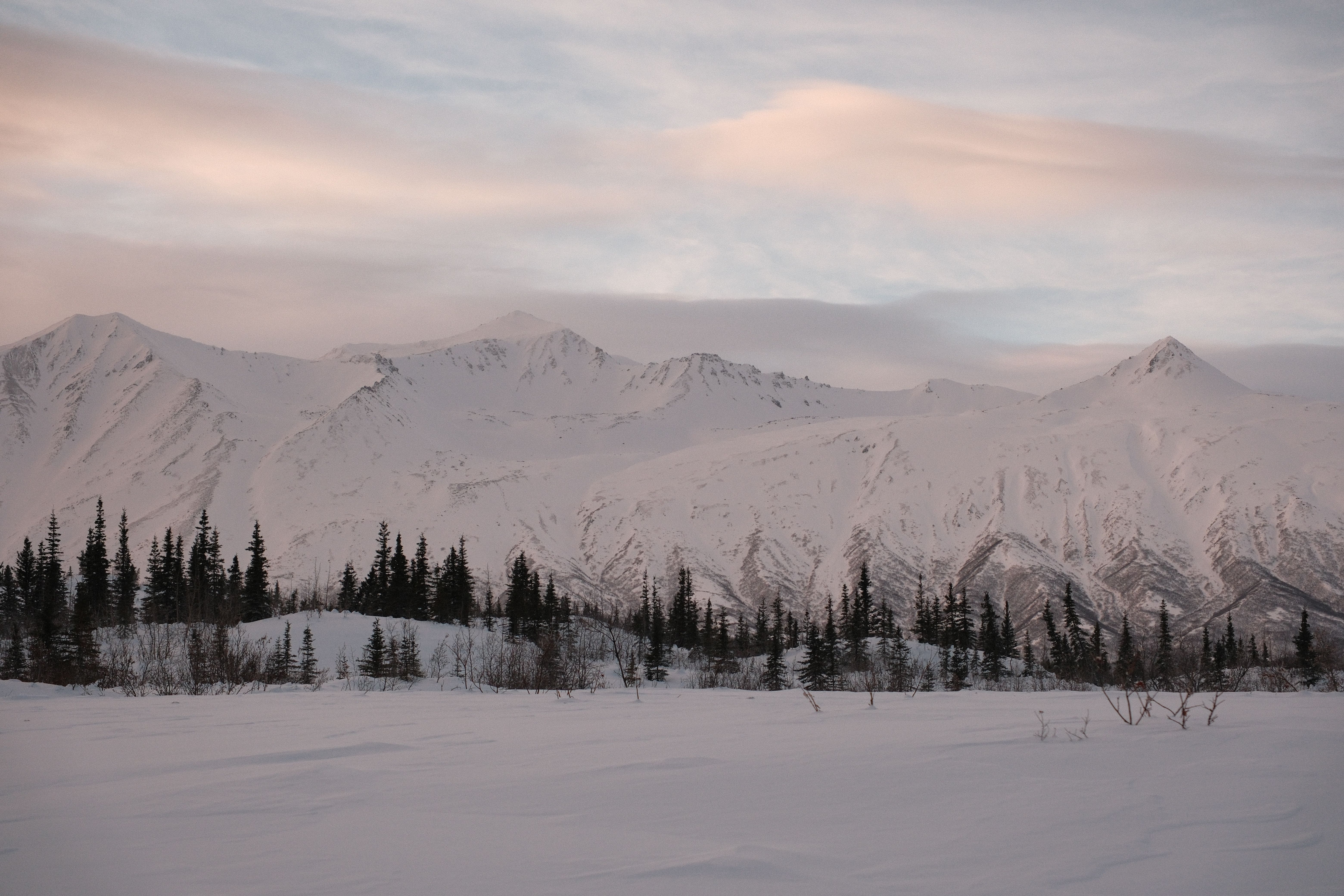 White Field and Mountains in Snow · Free Stock Photo