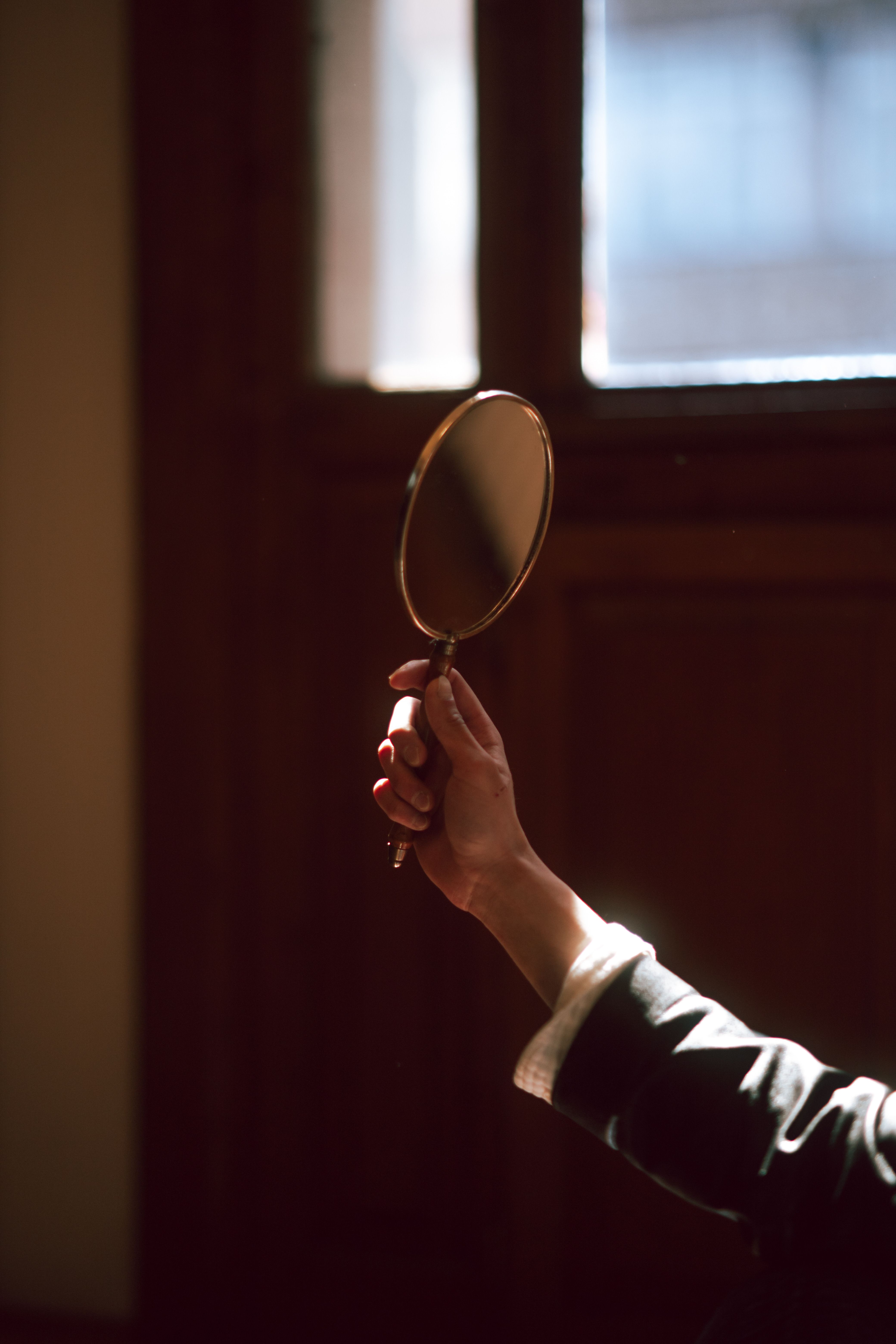 Person Hand Holding Mirror · Free Stock Photo