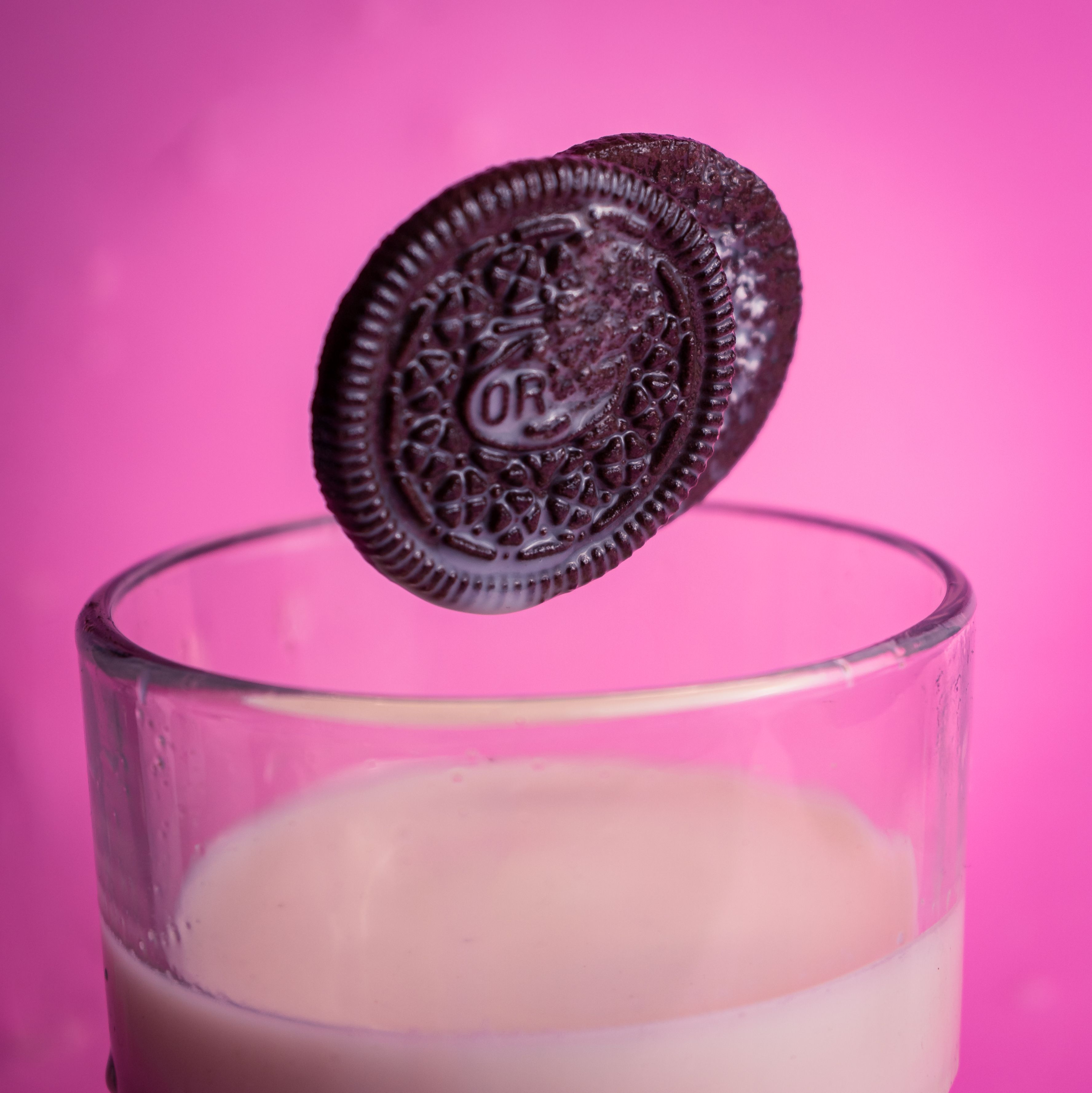 Oreo Cookies over Glass of Milk · Free Stock Photo