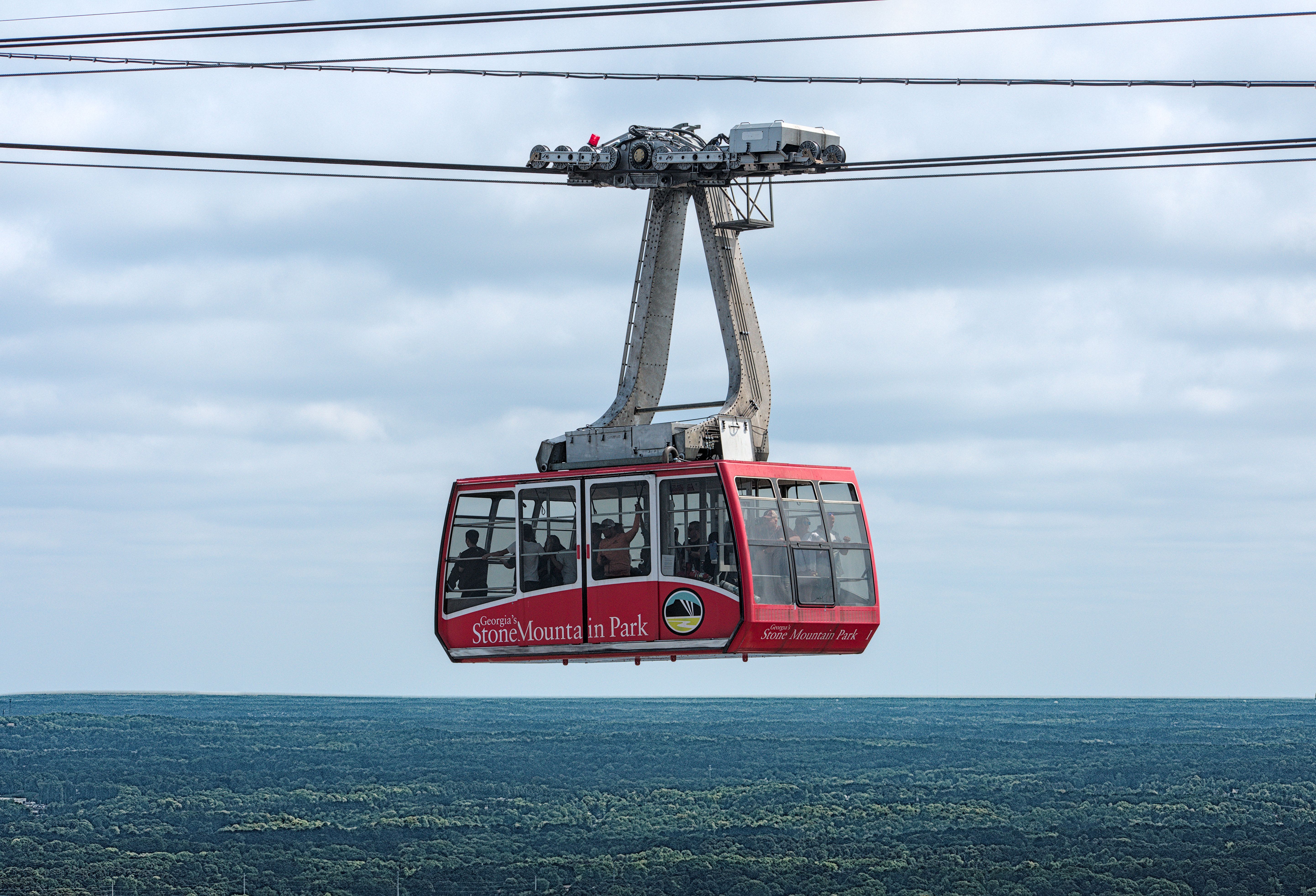 A cable car with a red and white stripe · Free Stock Photo
