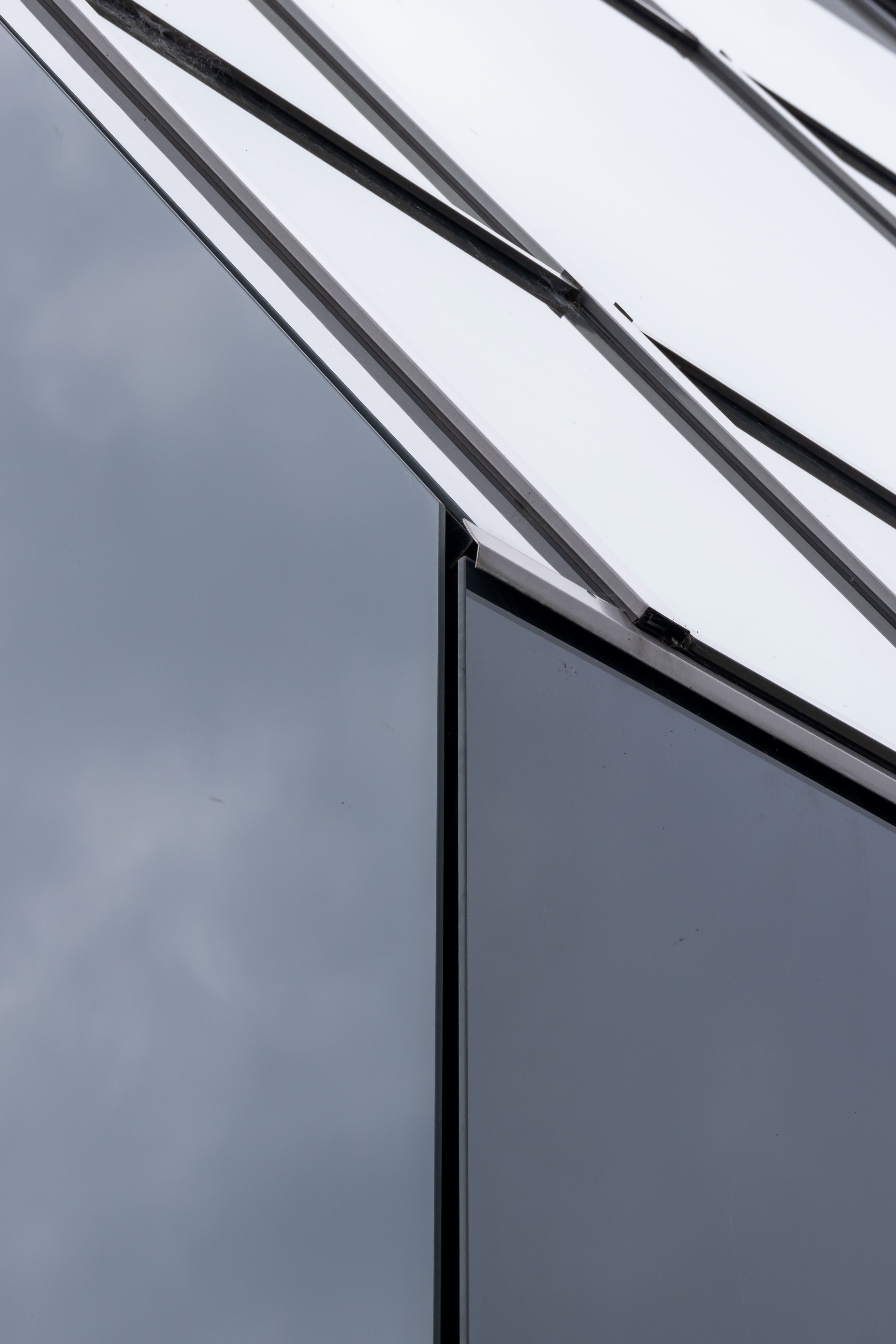 Windows in Building Corner · Free Stock Photo